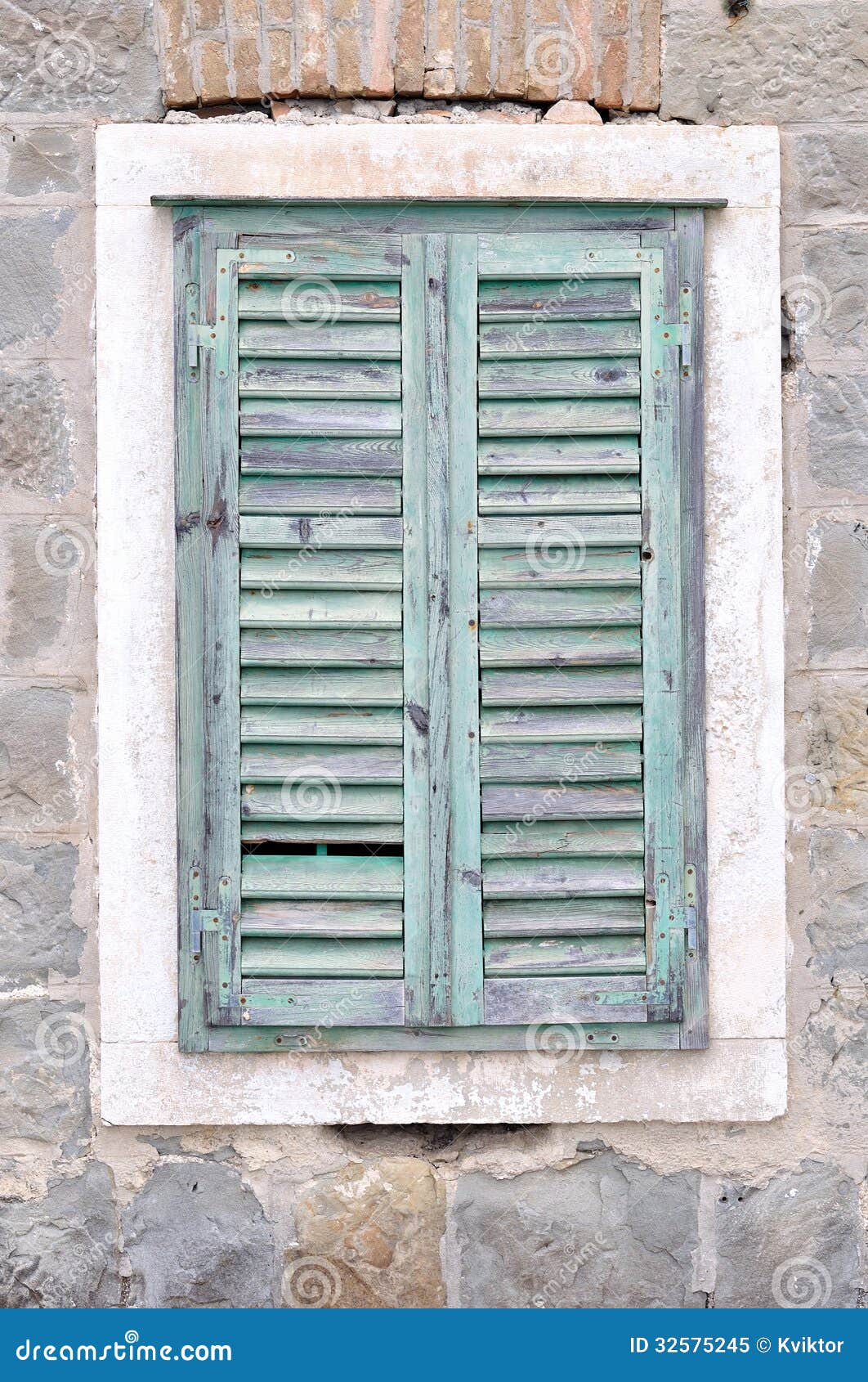 Closed Shutters Of Windows On An Old Stone Wall. Bottom View. Old ...