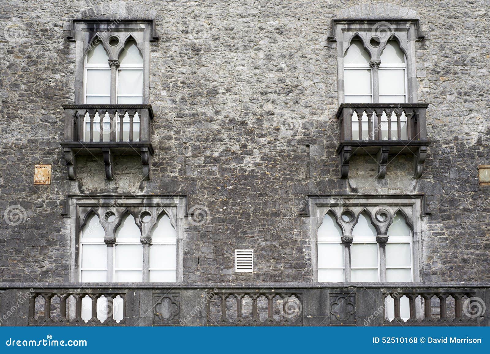 Old windows with balcony stock photo. Image of kilkenny - 52510168
