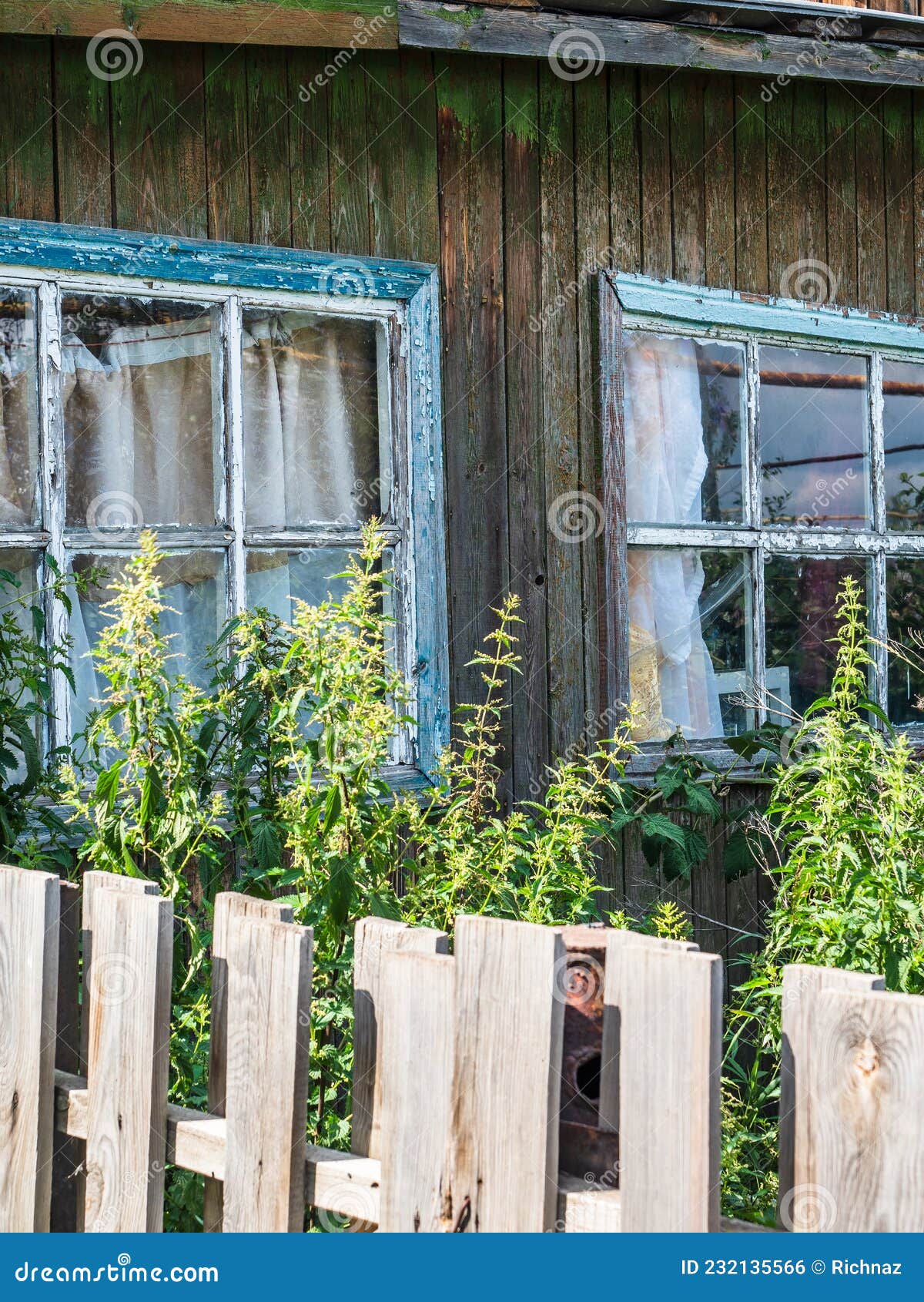 Old Windows at a Wooden House with a Fence Stock Photo - Image of glass ...