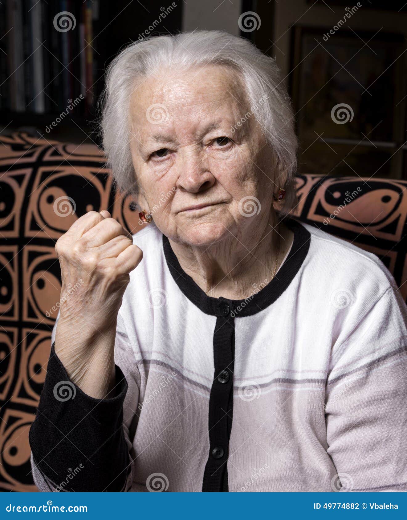 Old woman in angry gesture stock photo. Image of portrait - 49774882