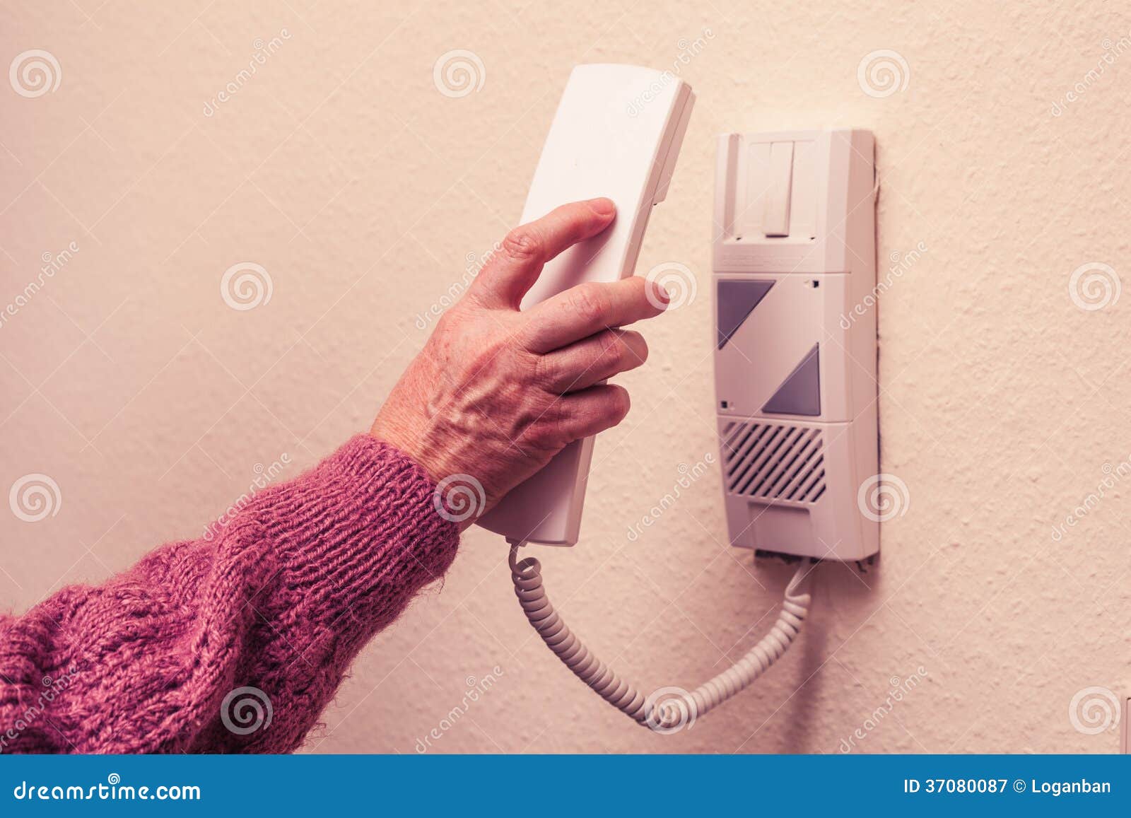 Old Woman Answering Intercom Stock Image - Image of alarm, security ...
