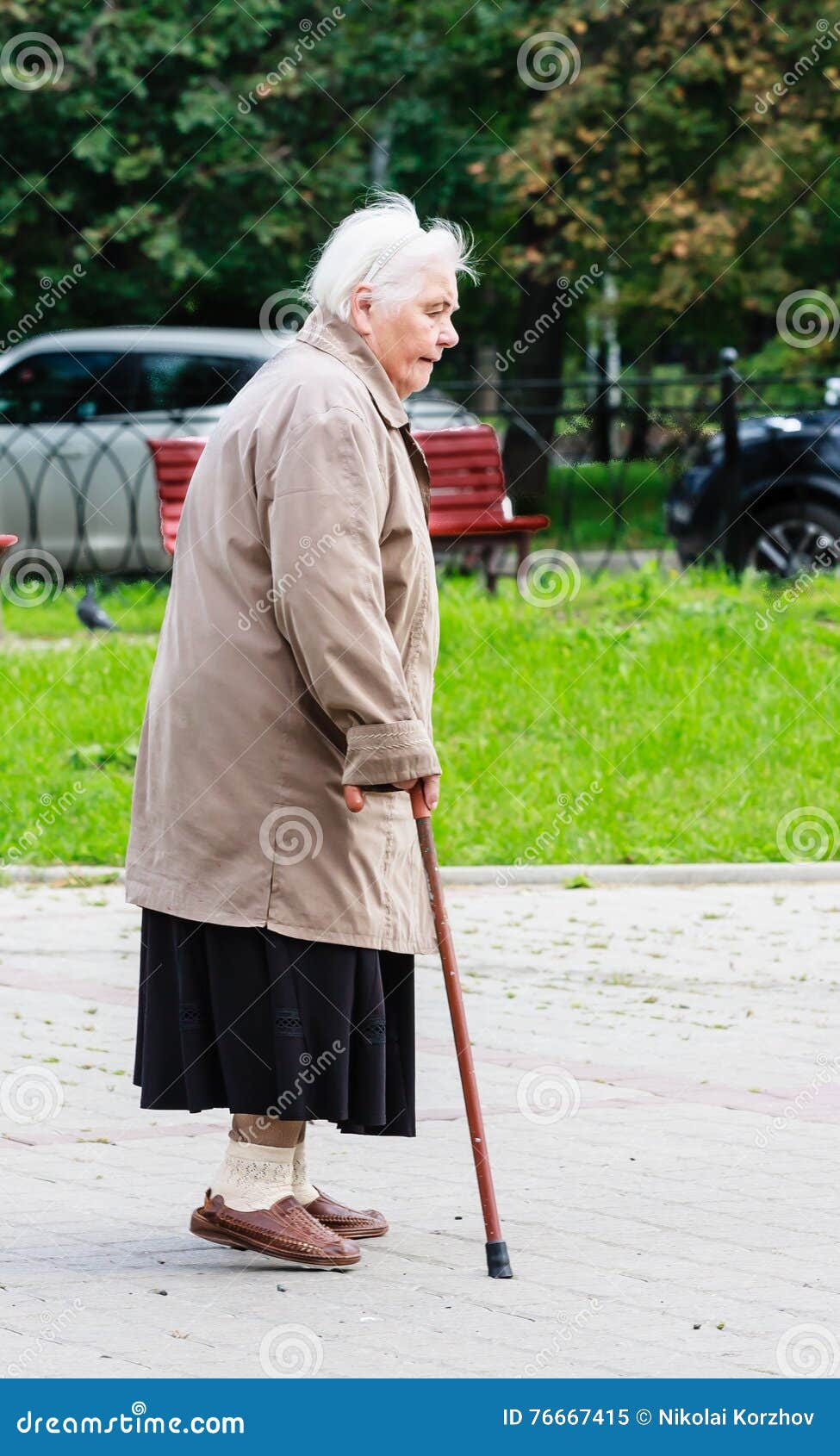 An old woman with a cane editorial image. Image of generation - 76667415