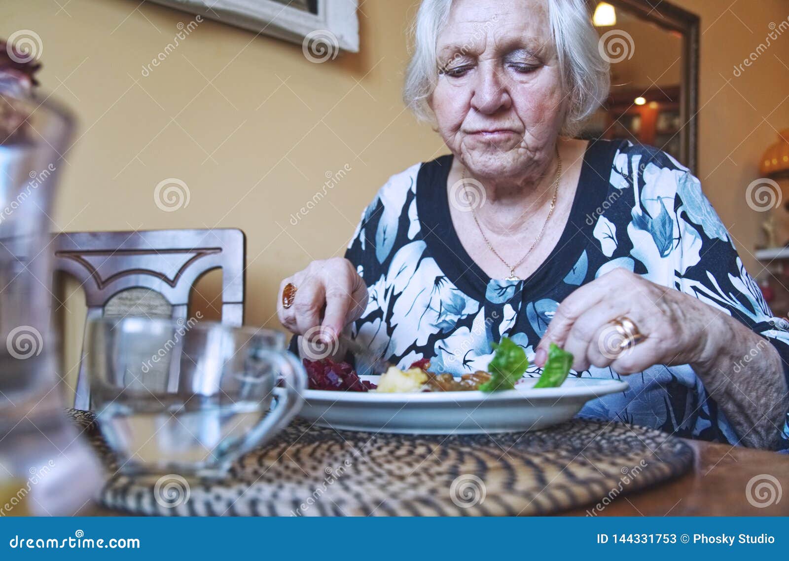 Old Woman Eating Dinner Alone. Stock Image - Image of plate, lonely ...