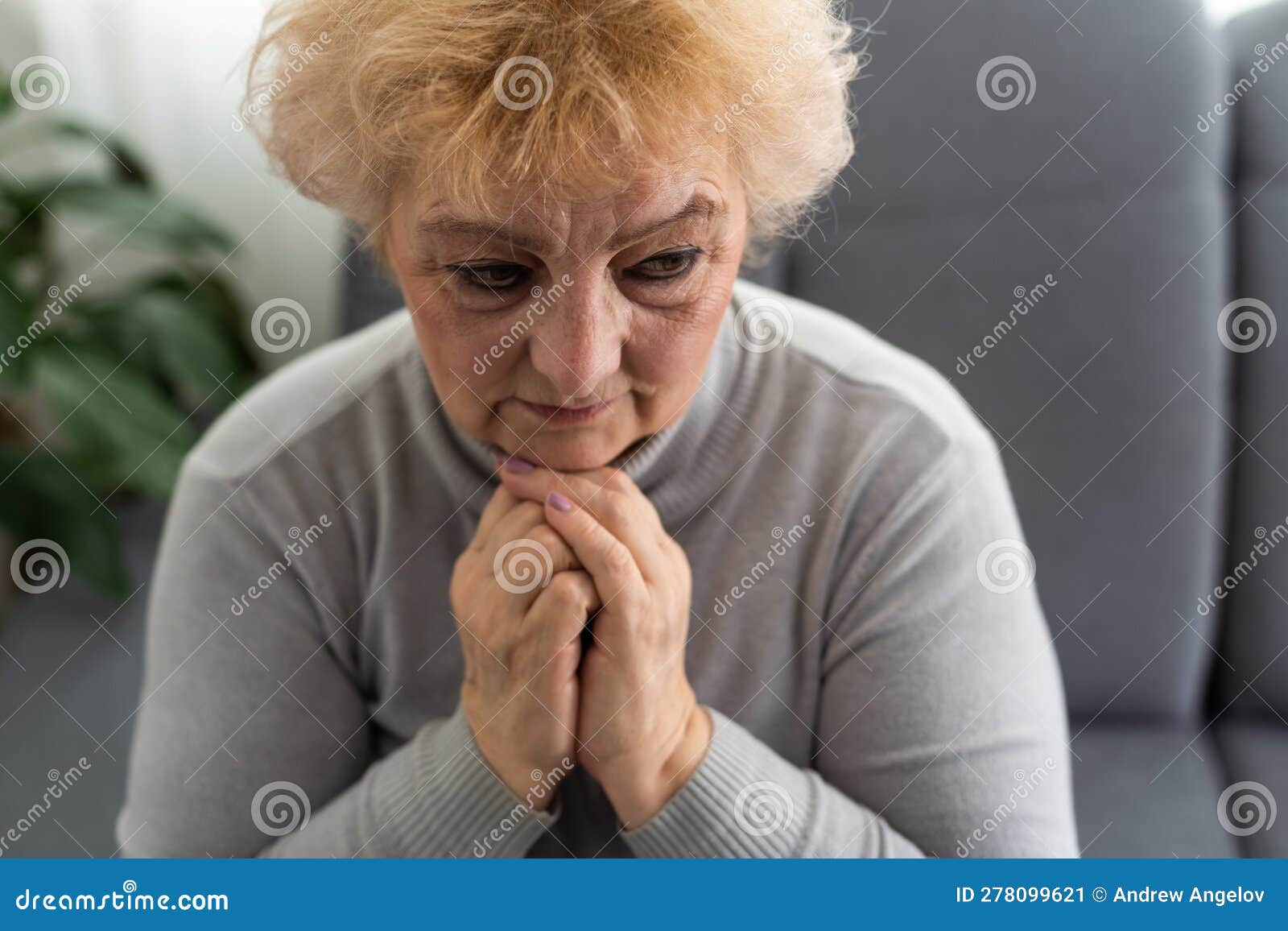 An old woman is praying stock image. Image of together - 278099621