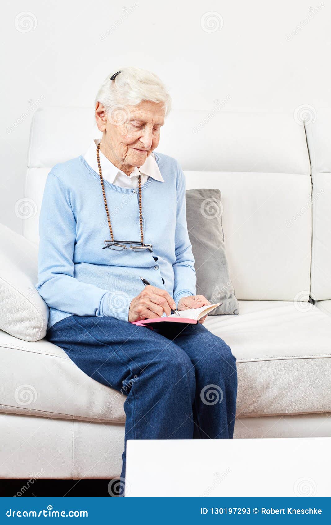 Old Woman Writes in a Notebook Stock Image - Image of senior, assisted ...