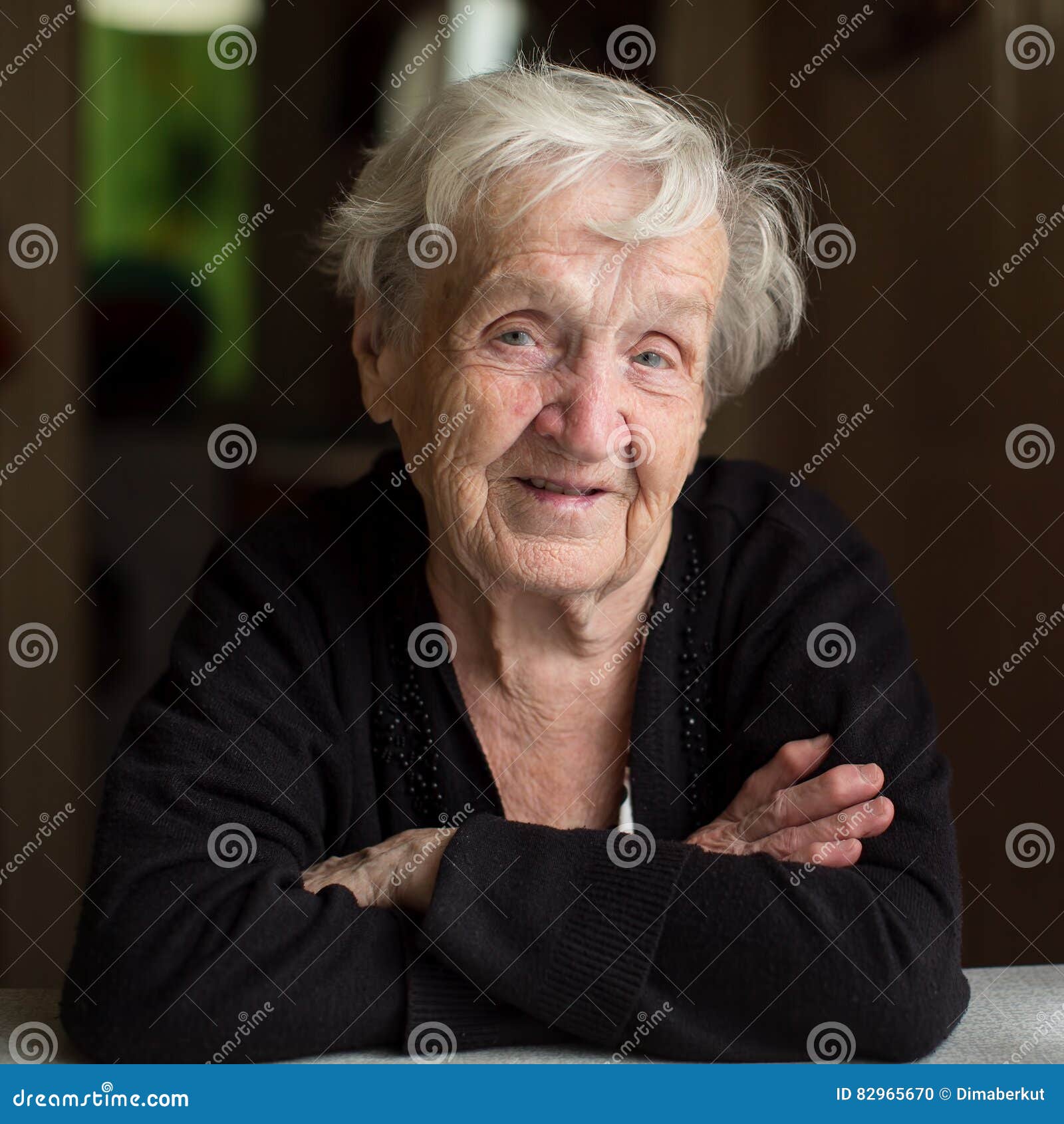 Old Woman Sitting at the Table. Stock Photo - Image of happy, people ...