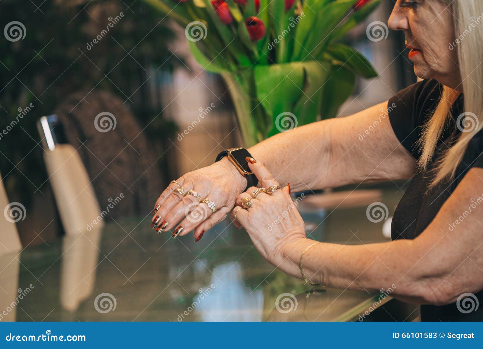 Old Woman Use Smartwatch at Home Stock Image - Image of aged, touch ...