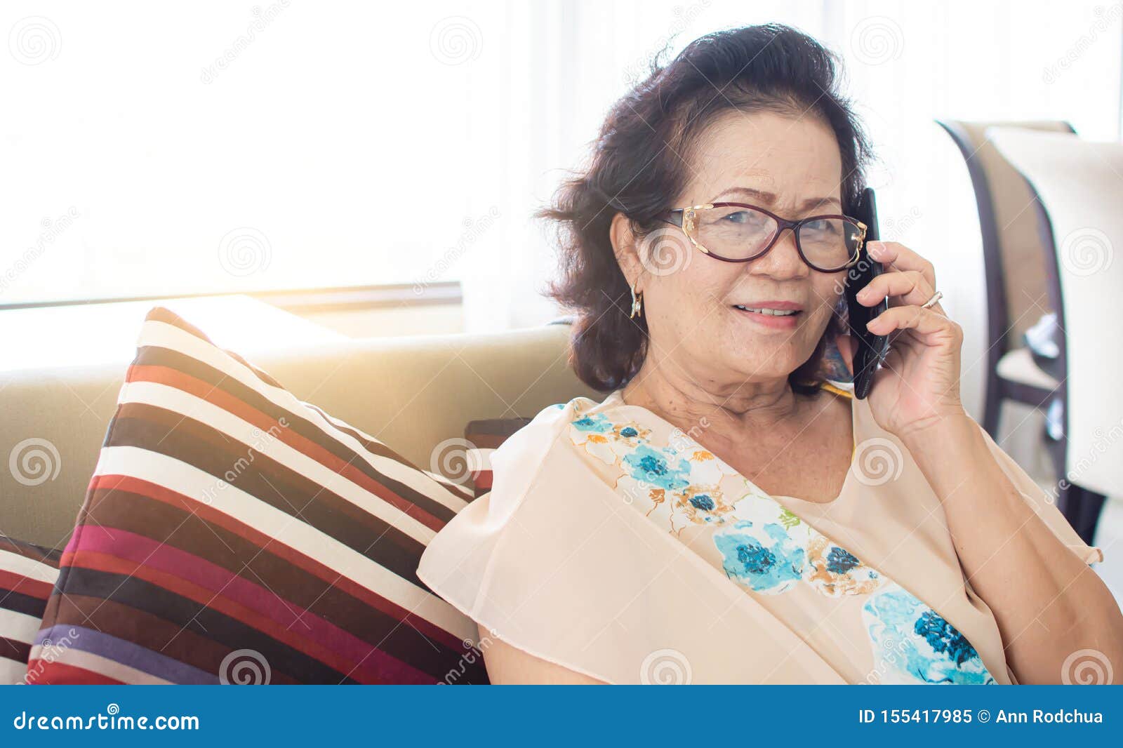 Old Woman Using Mobile Phone at Home Stock Image - Image of female ...