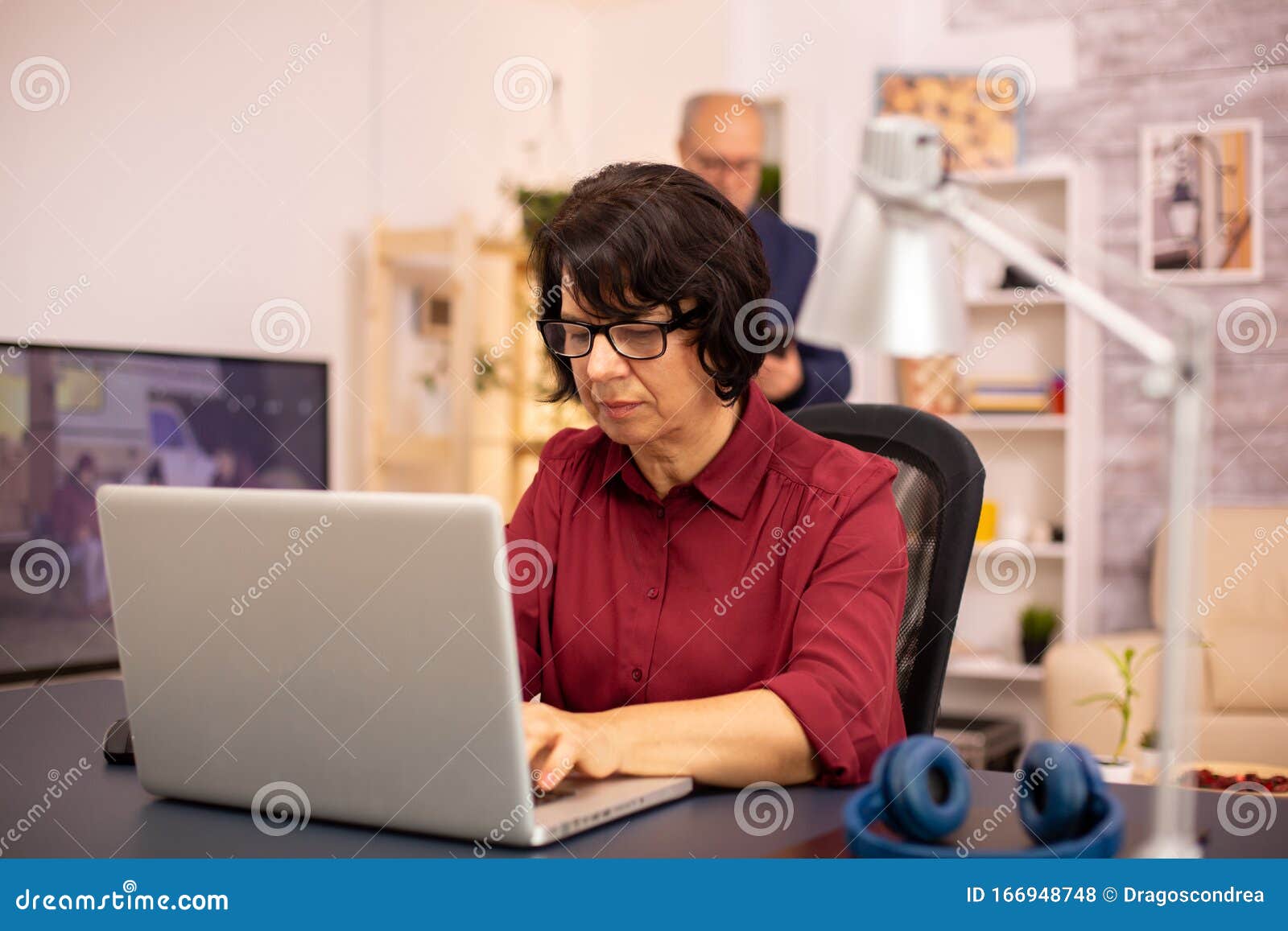 Old Woman Using a Modern Computer in Her Living Room Stock Photo ...