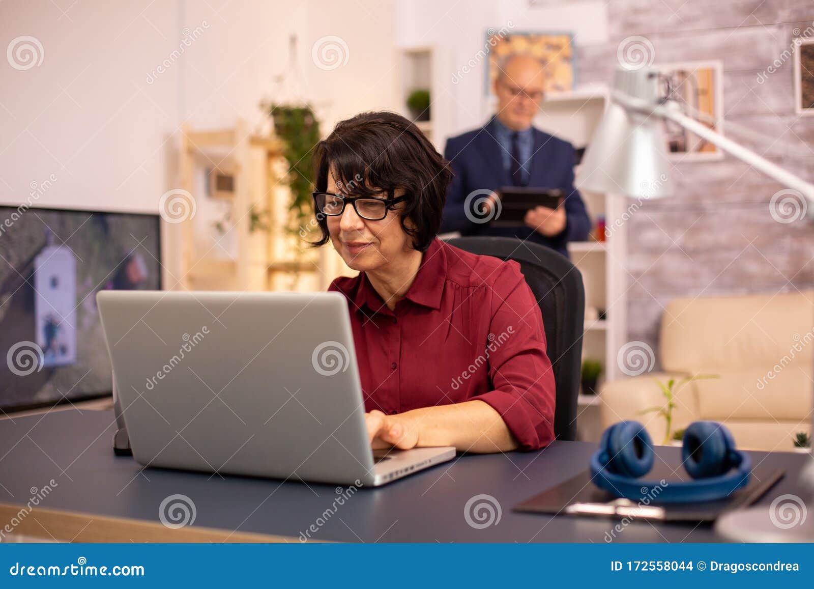 Old Woman Using a Modern Computer in Her Living Room Stock Photo ...