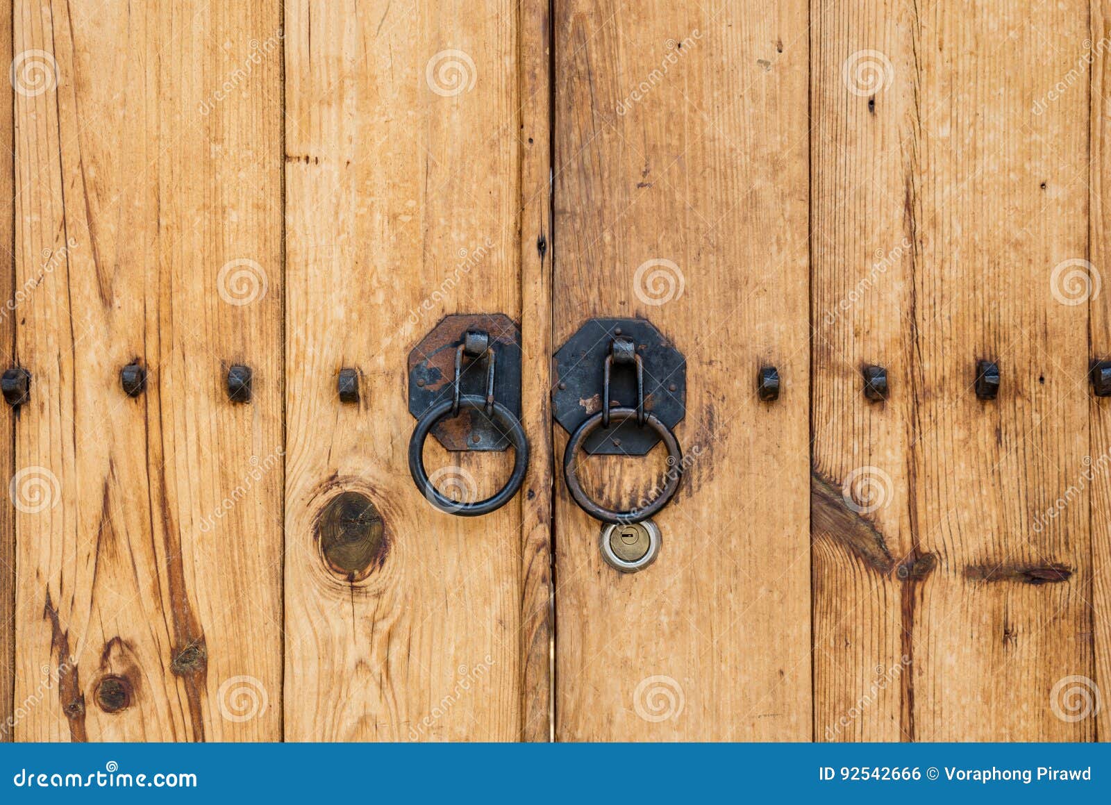 Old Wood Door with Metal Rings Stock Photo - Image of design ...