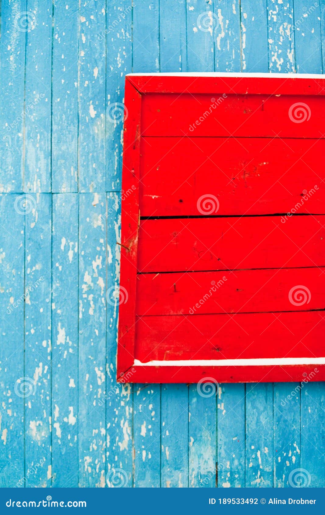 Old Wood Red and Blue Rectangle on a Blue Wall Background Stock Photo ...
