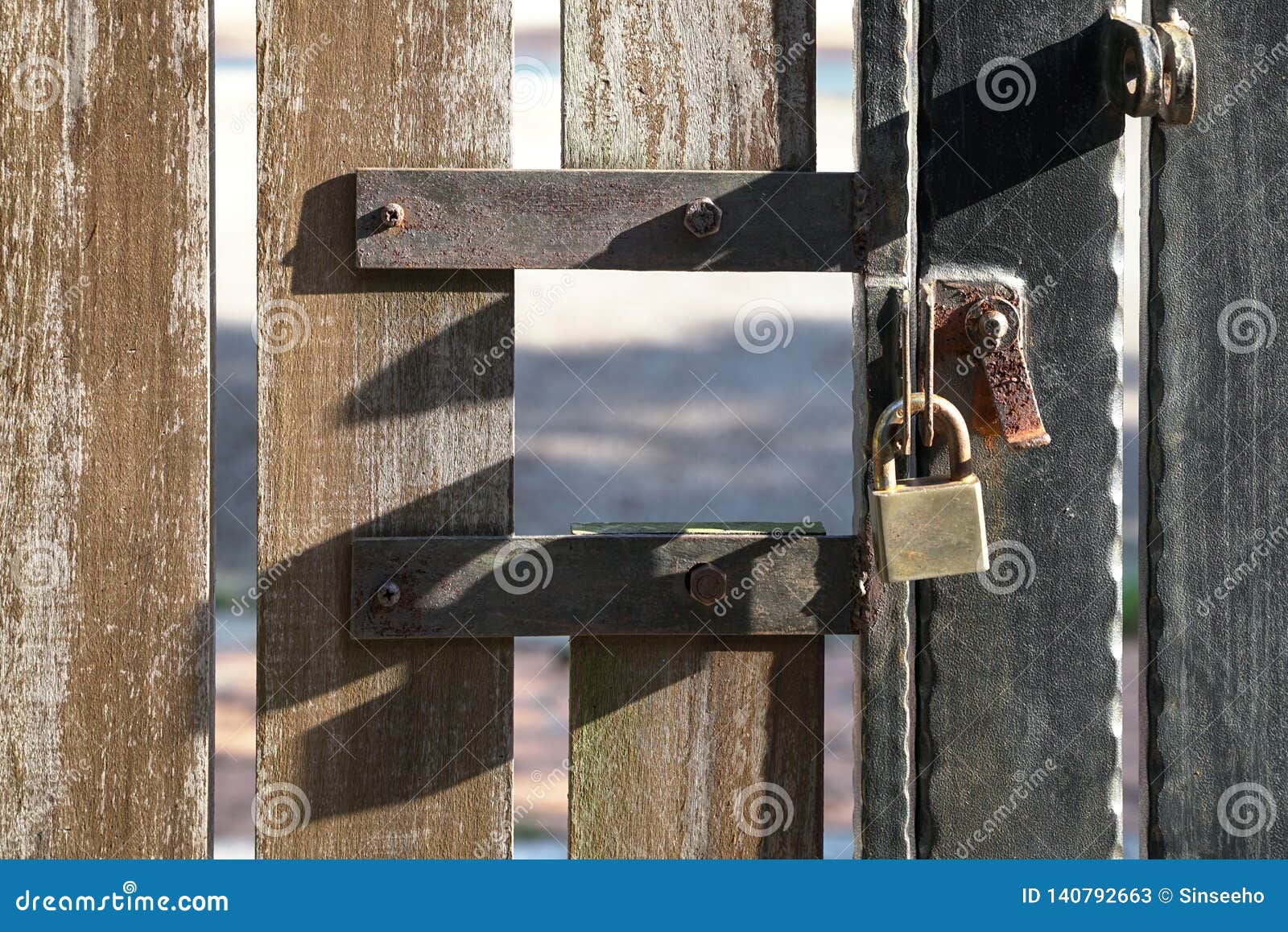 Old Wood and Steel Gate Locked Stock Image - Image of closed, rustic ...