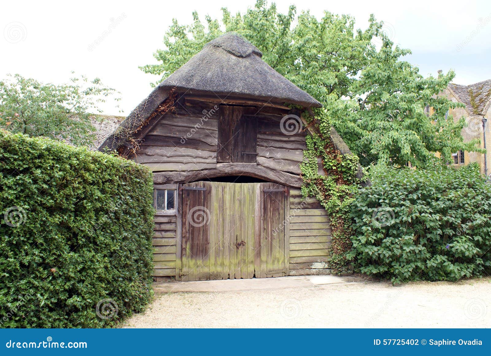 An Old Wooden Barn with a Thatched Roof Stock Photo - Image of place ...