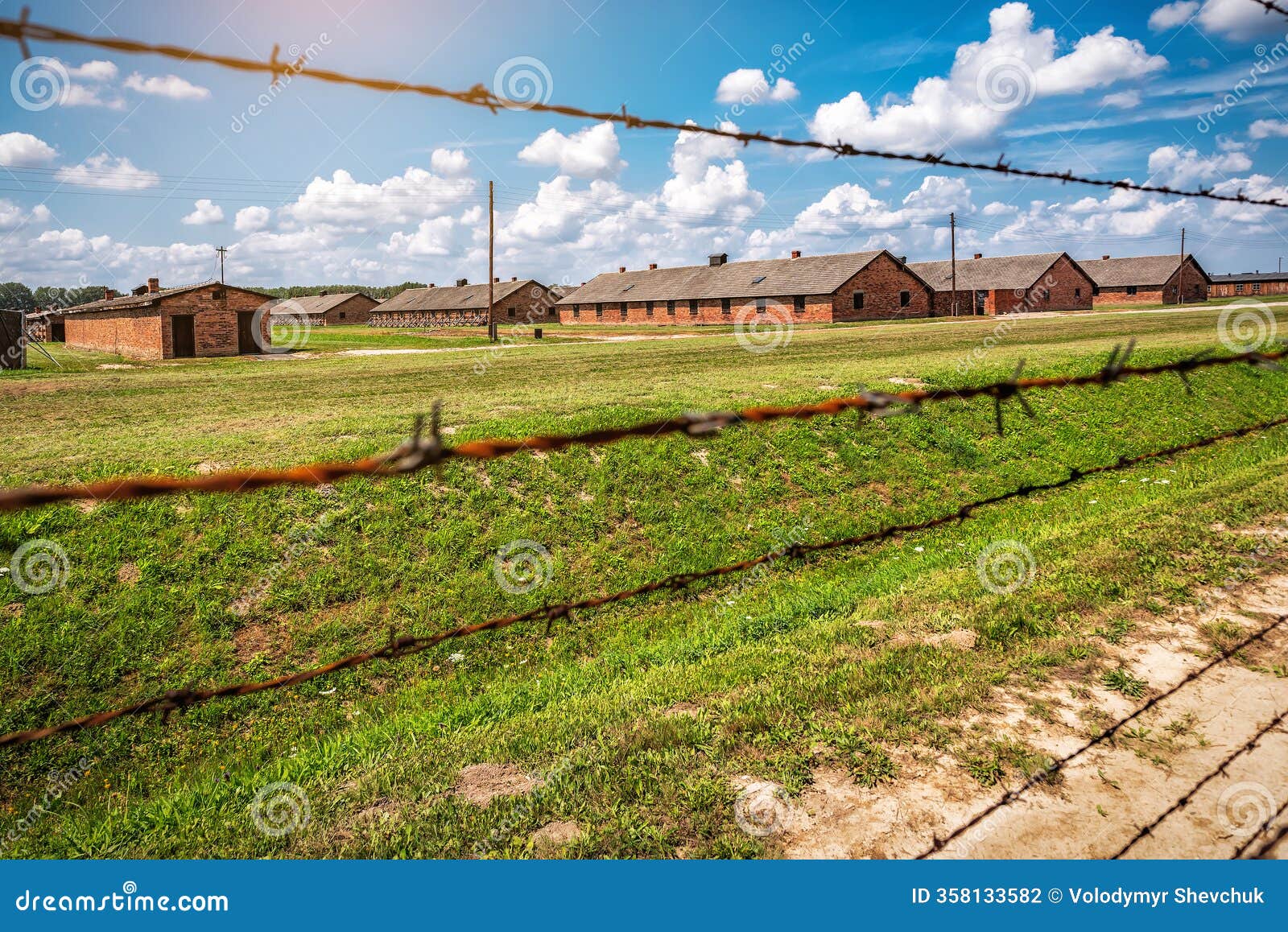 Old Wooden Barracks Behind Barbed Wire, Old Prison Stock Photo - Image ...