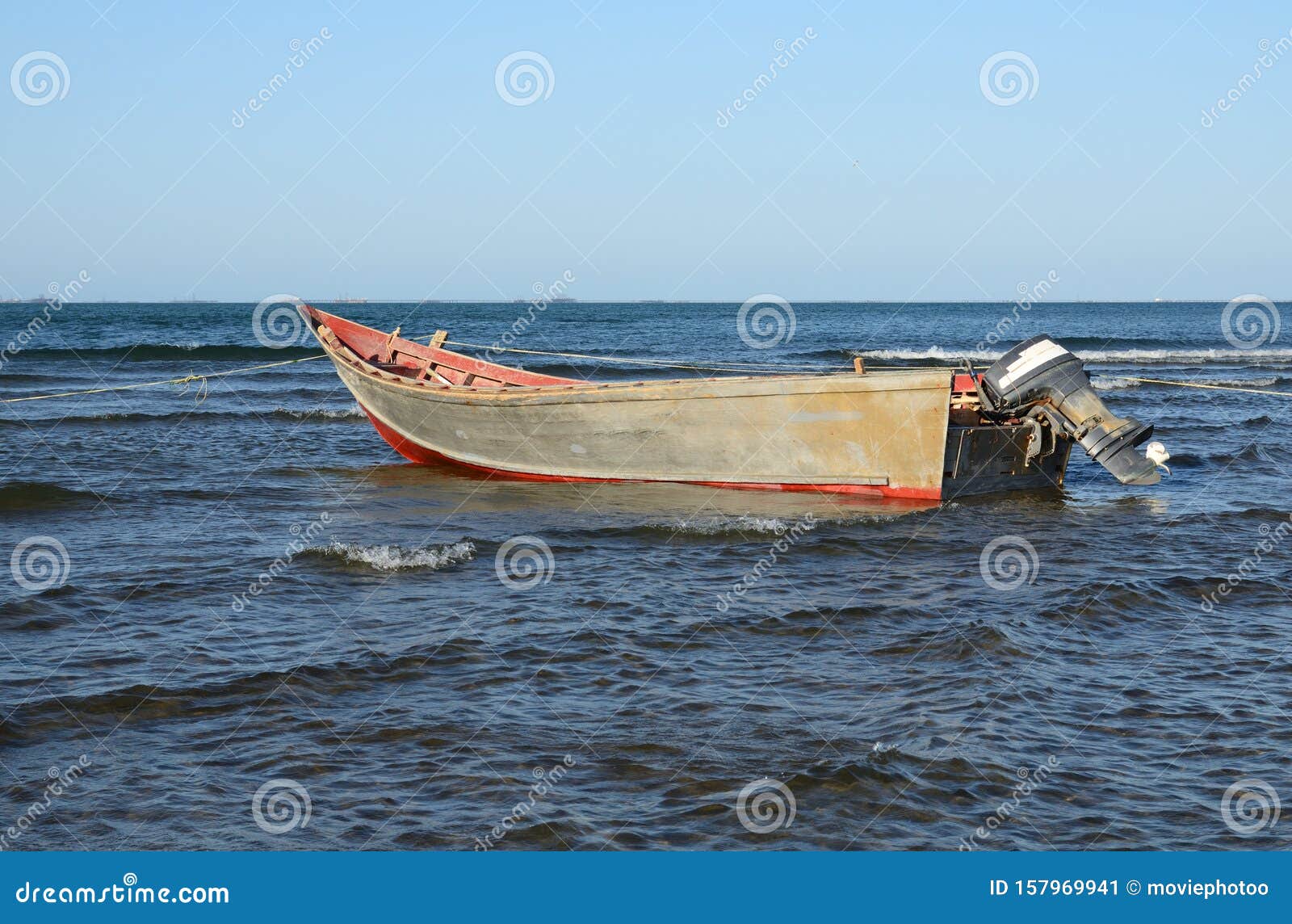 Old wooden boat by the sea stock image. Image of lake - 157969941