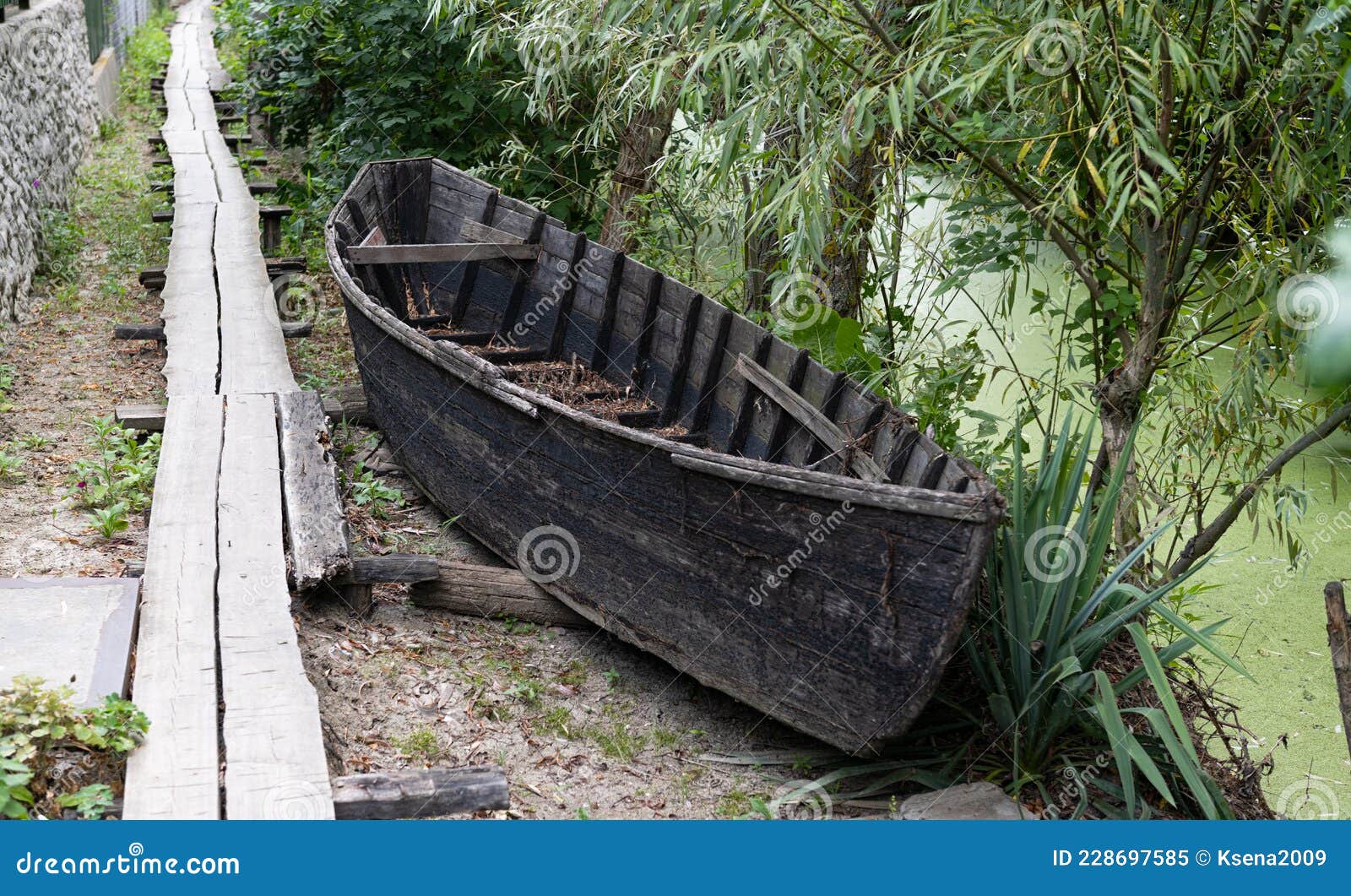 Old wooden boat the shore stock image. Image of boats - 228697585
