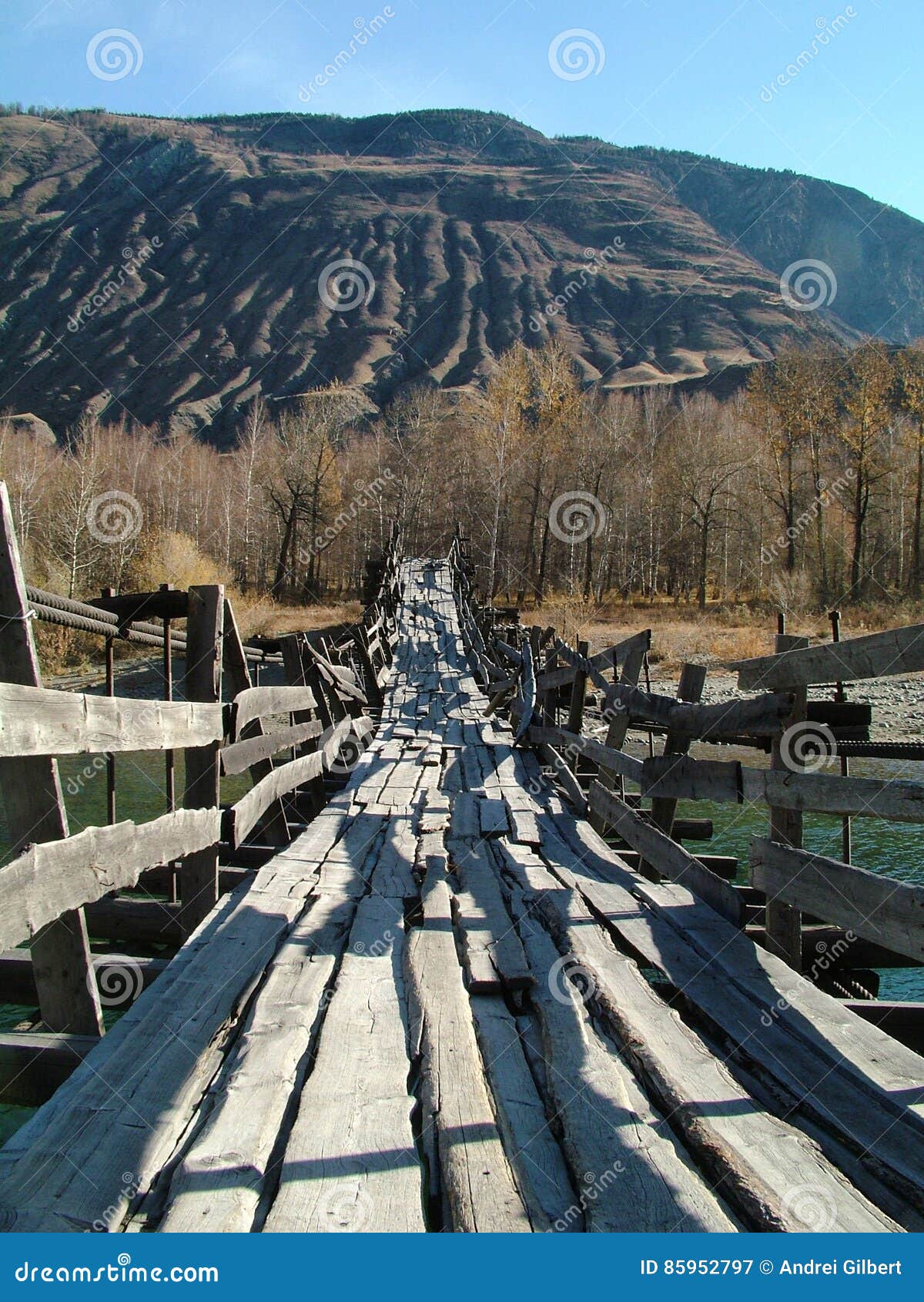 Old Wooden Bridge Over a River in the Mountains Stock Image - Image of ...