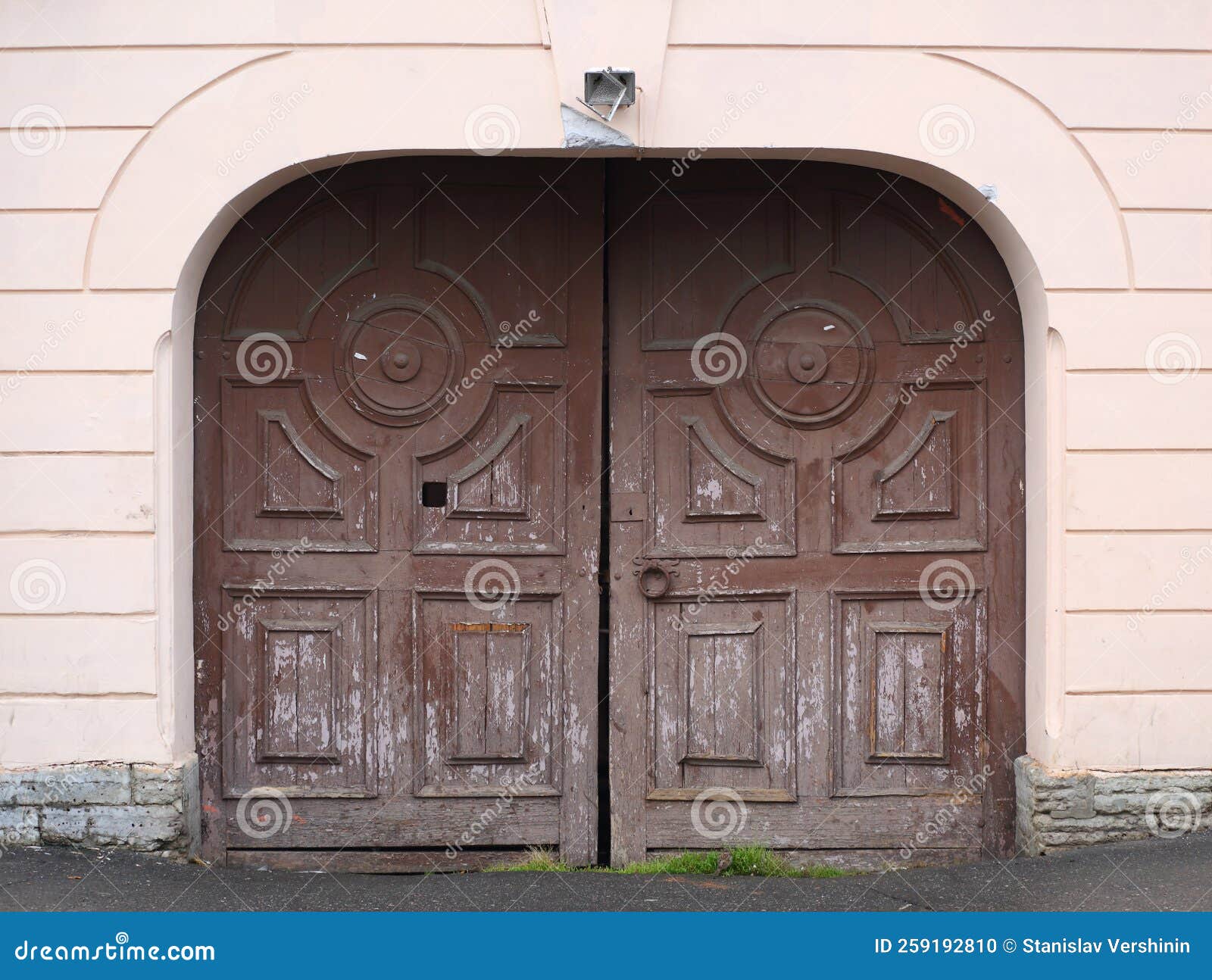 Old Wooden Brown Gate in a Light Wall Stock Photo - Image of light ...