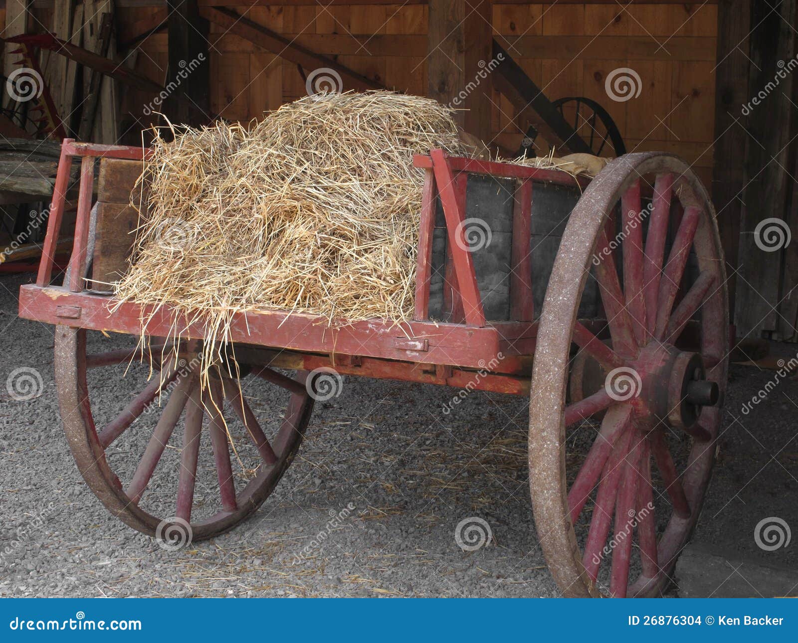 Old wooden cart with hay. stock photo. Image of load - 26876304