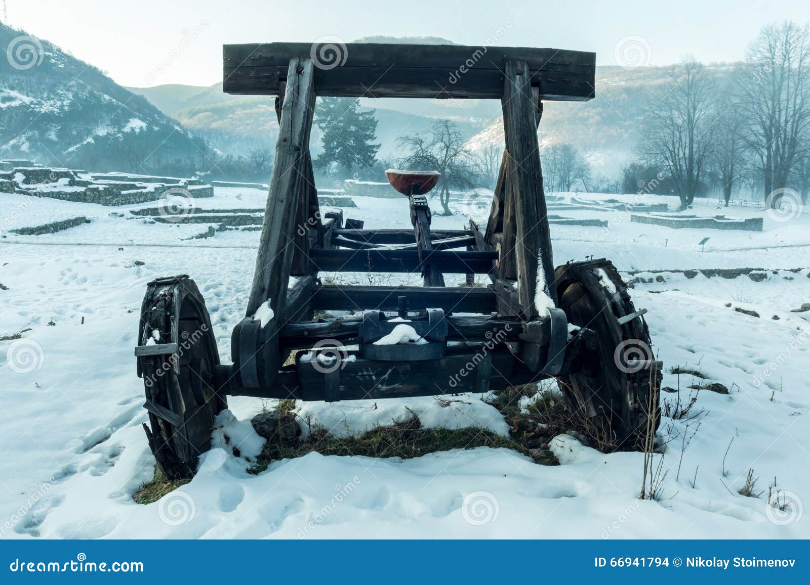 Old wooden catapult stock photo. Image of objects, snow - 66941794