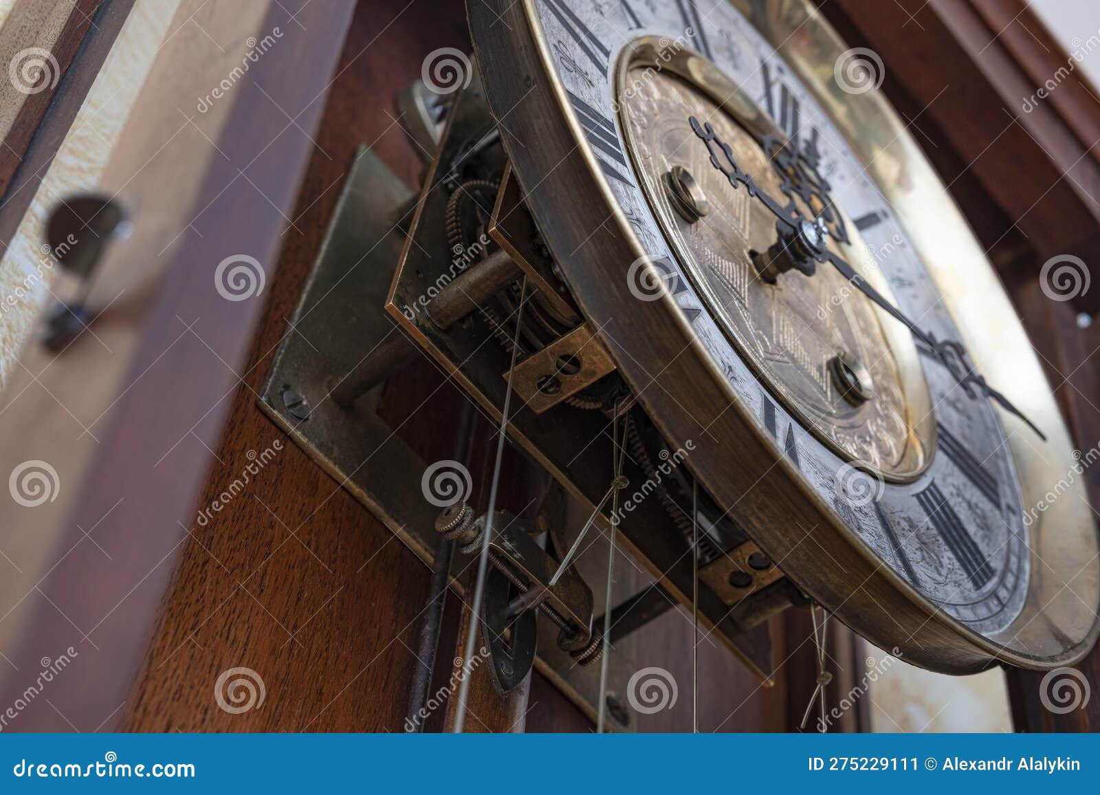 Old Wooden Clock with a Pendulum Hanging on Stock Image - Image of ...