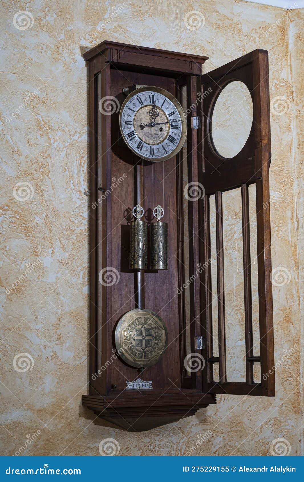 Old Wooden Clock with a Pendulum Hanging on Stock Image - Image of ...