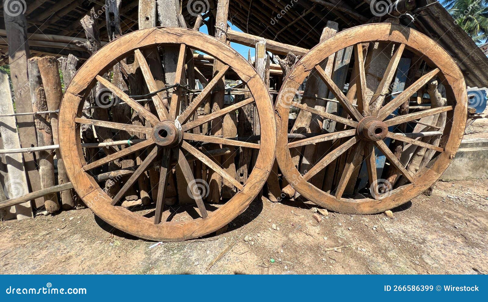 Old Wooden Decorative Wagon Wheel in a Barn Stock Image - Image of ...
