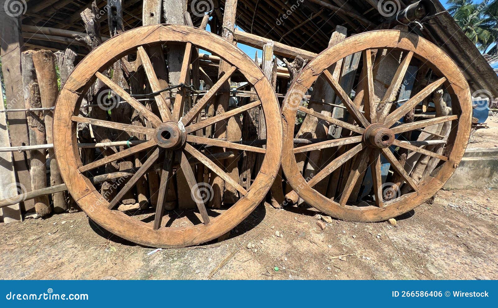 Old Wooden Decorative Wagon Wheel in a Barn Stock Photo - Image of ...