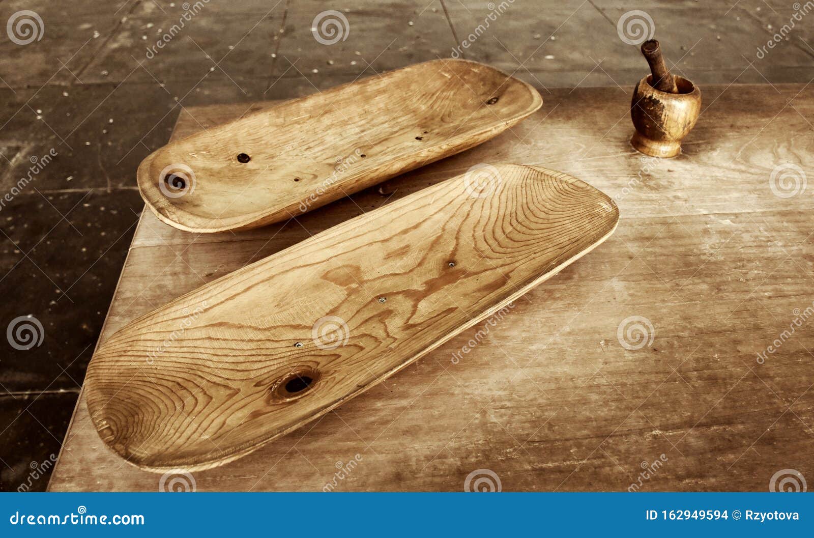 Old wooden dishes on table stock photo. Image of retro - 162949594