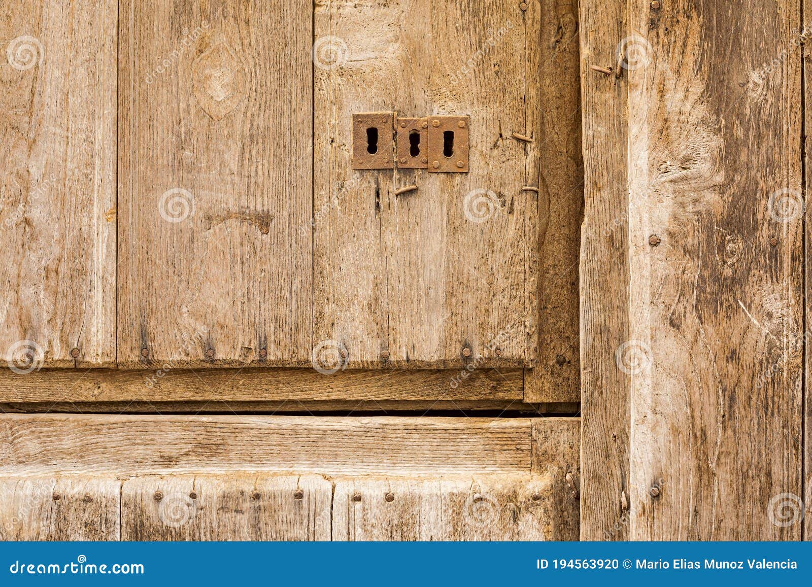 An Old Wooden Door with Three Locks Stock Photo - Image of board ...