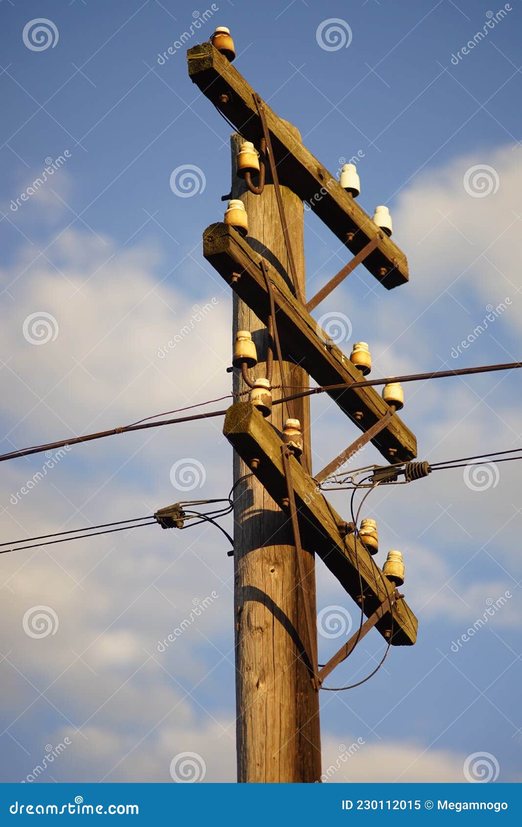 Old Wooden Electric Pillar in Blue Sky with White Clouds Stock Image ...
