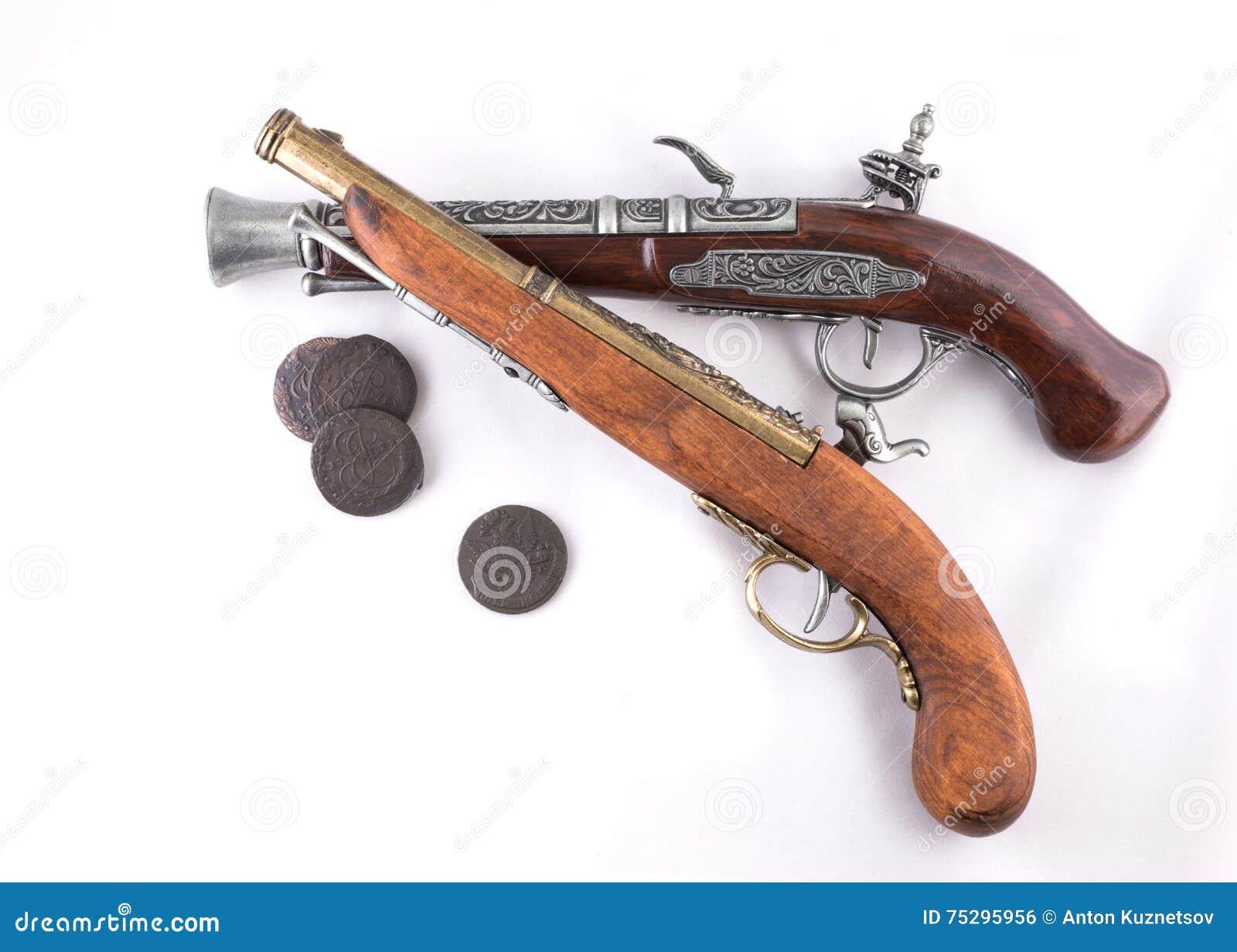 Old wooden guns and coins stock photo. Image of antique - 75295956
