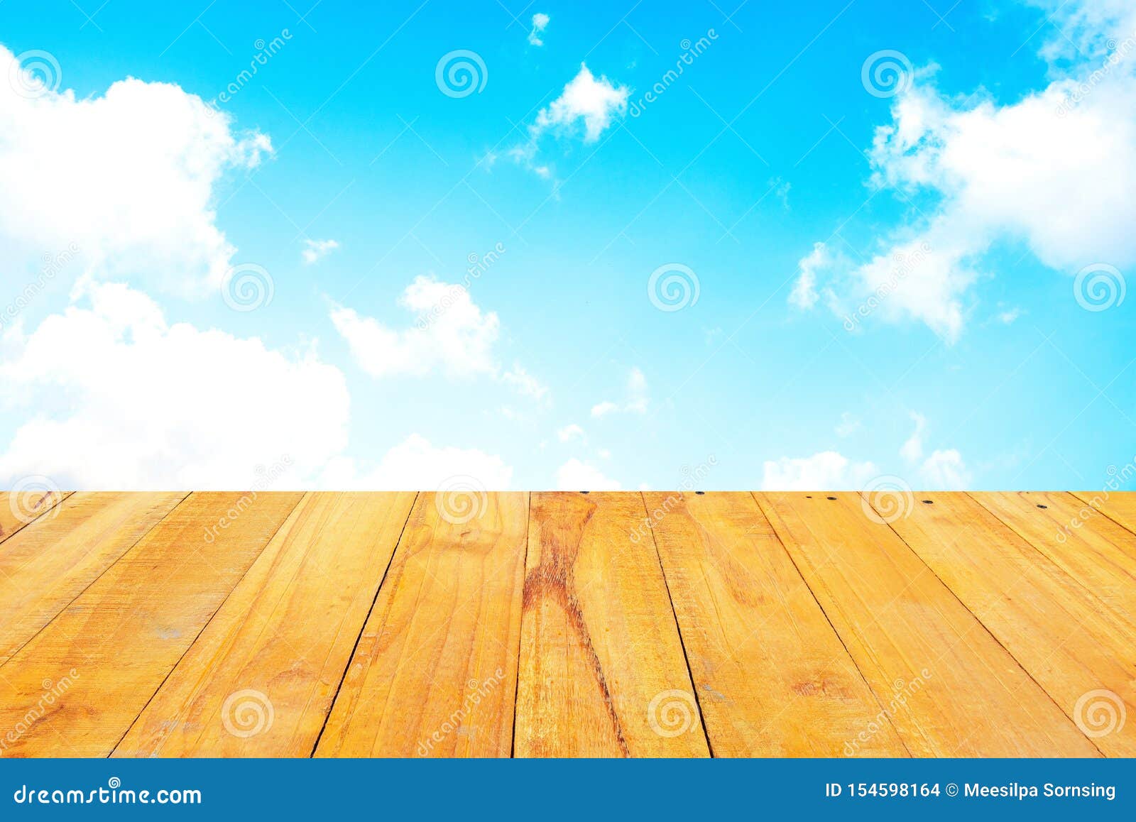 Old Wooden Table with Blue Sky White Cloud Background Stock Photo ...
