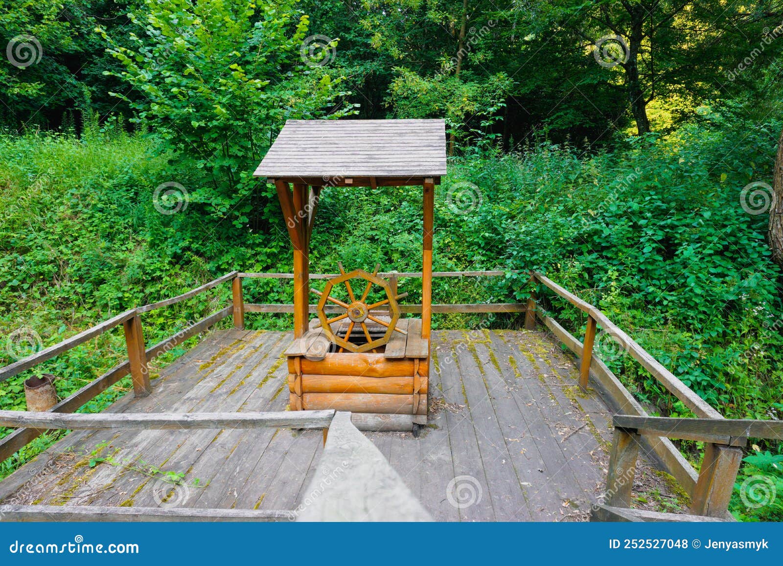 Old Wooden Well in the Middle of the Forest. Stock Photo - Image of ...