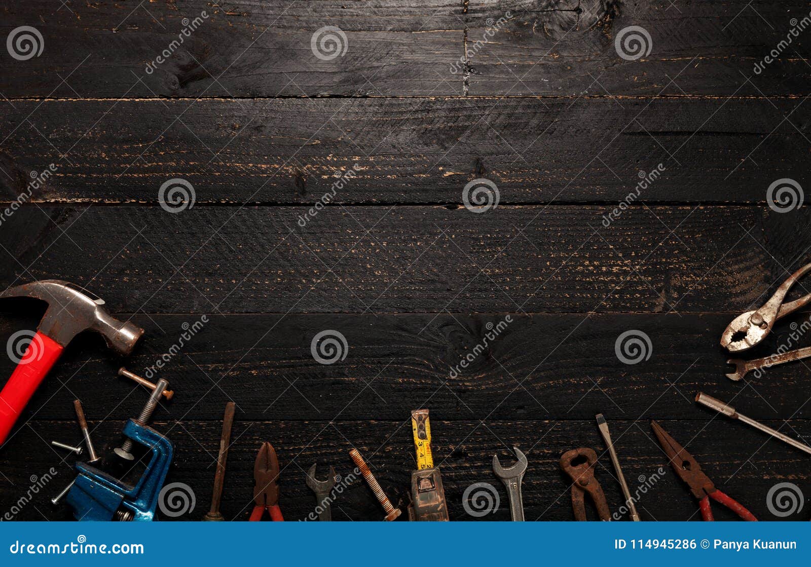 Old Working Tools on a Dark Black Wood Background. Stock Photo - Image ...
