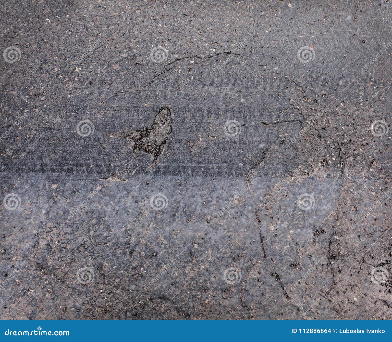 Old Worn Asphalt Road with Cracks Stock Photo - Image of asphalt ...