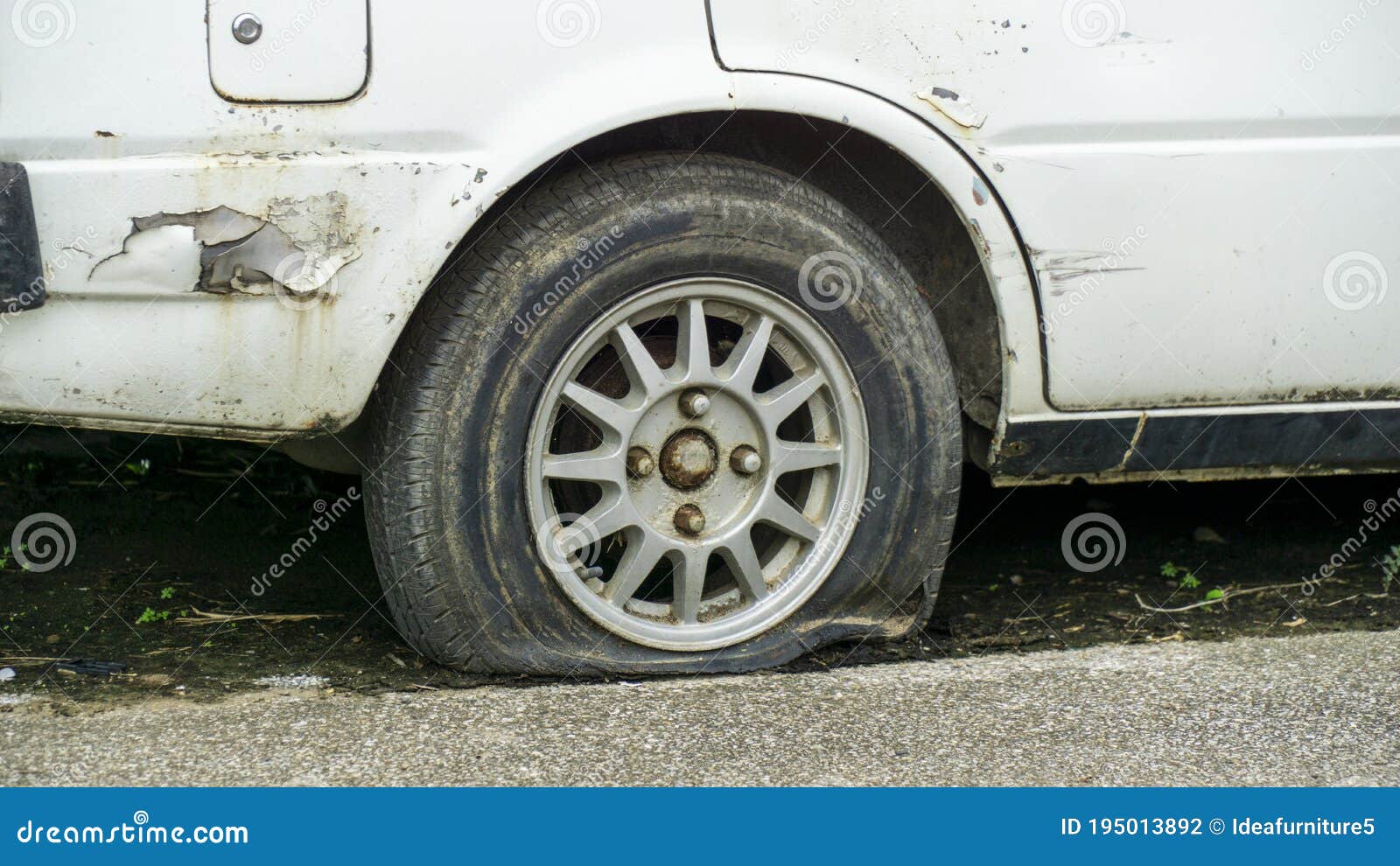 Old Worn Out and Rusted Abandoned Car with Flat Tyre Stock Photo ...