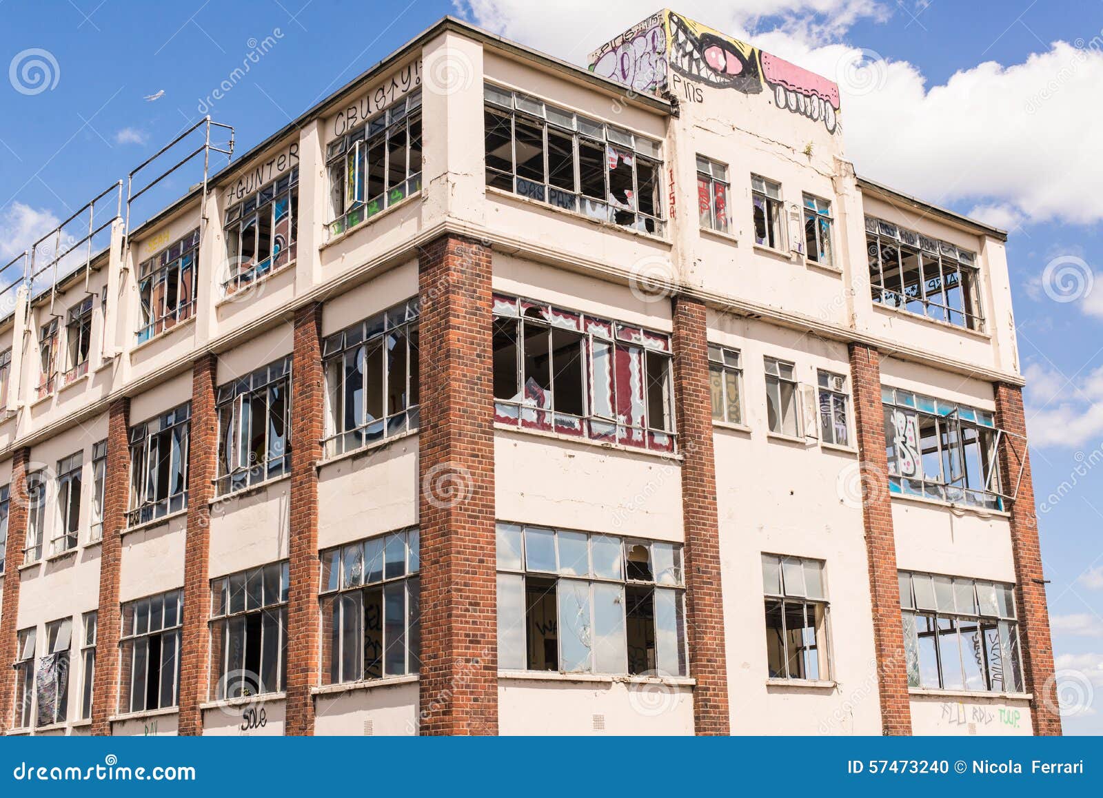 Old, Wrecked and Ruined Industrial Building with Broken Windows Stock ...