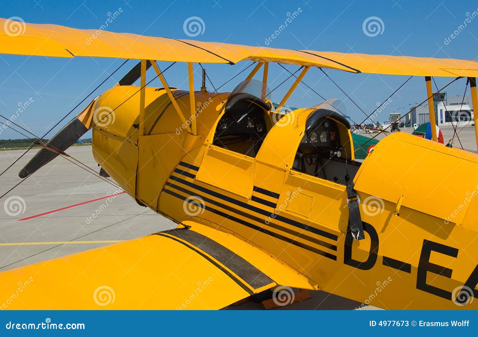 Yellow Biplane Over Large Canyon Stock Photo | CartoonDealer.com #9452616