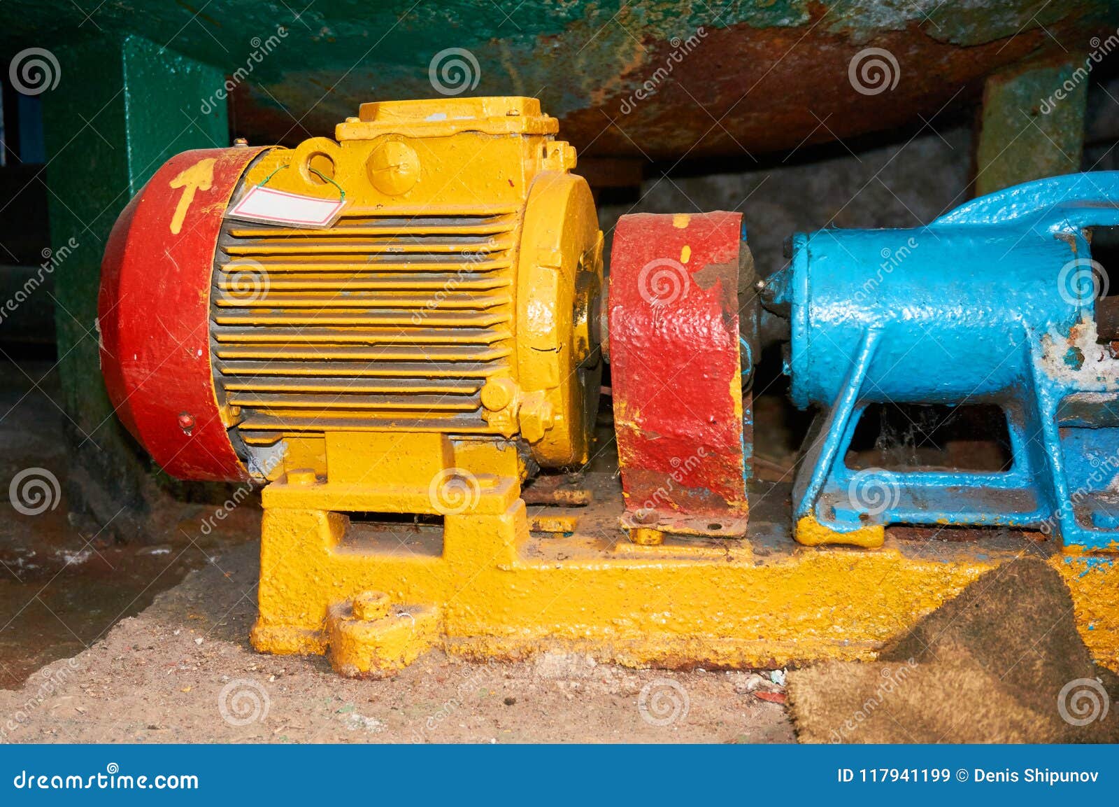 Old Yellow Electric Motor with a Blue Pump Connected. Stock Image ...