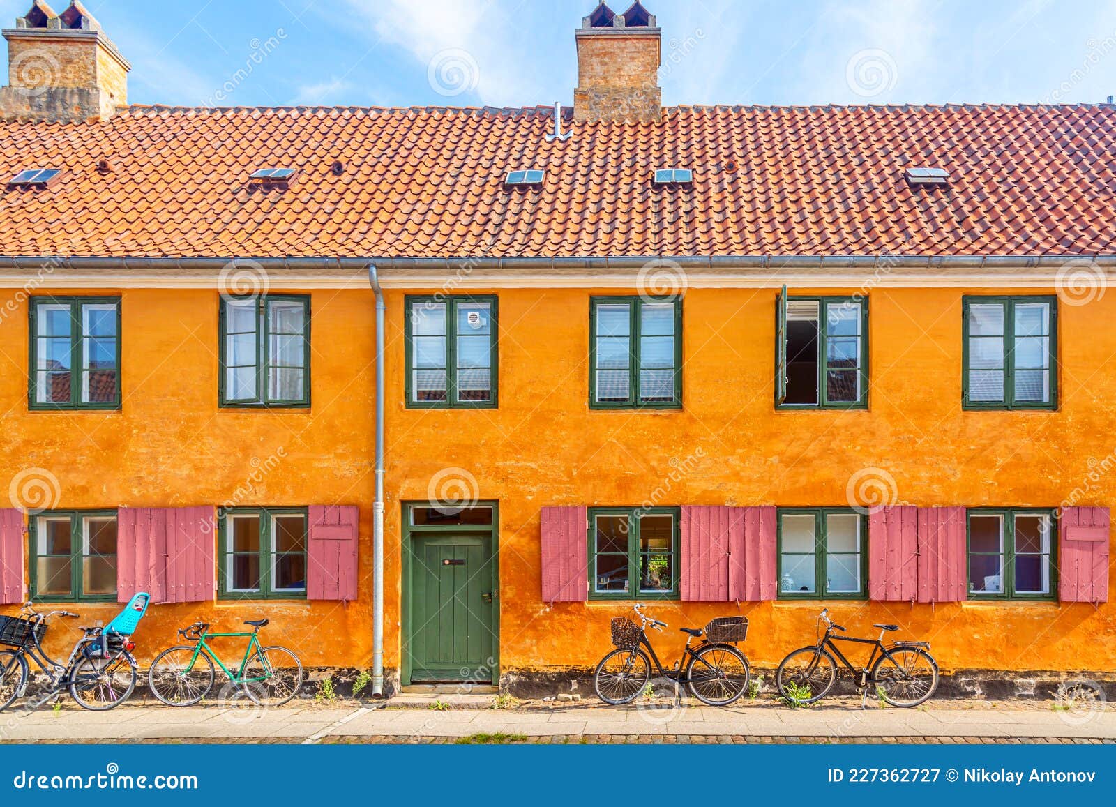 Old Yellow House of Nyboder District with Bikes. Old Medieval District ...