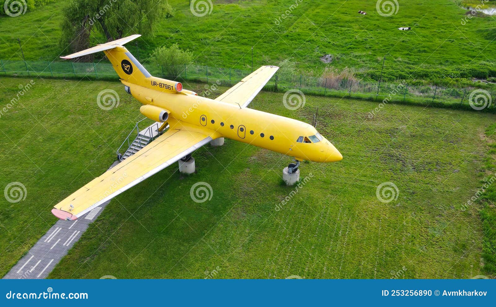 Old yellow passenger plane stock photo. Image of airport - 253256890