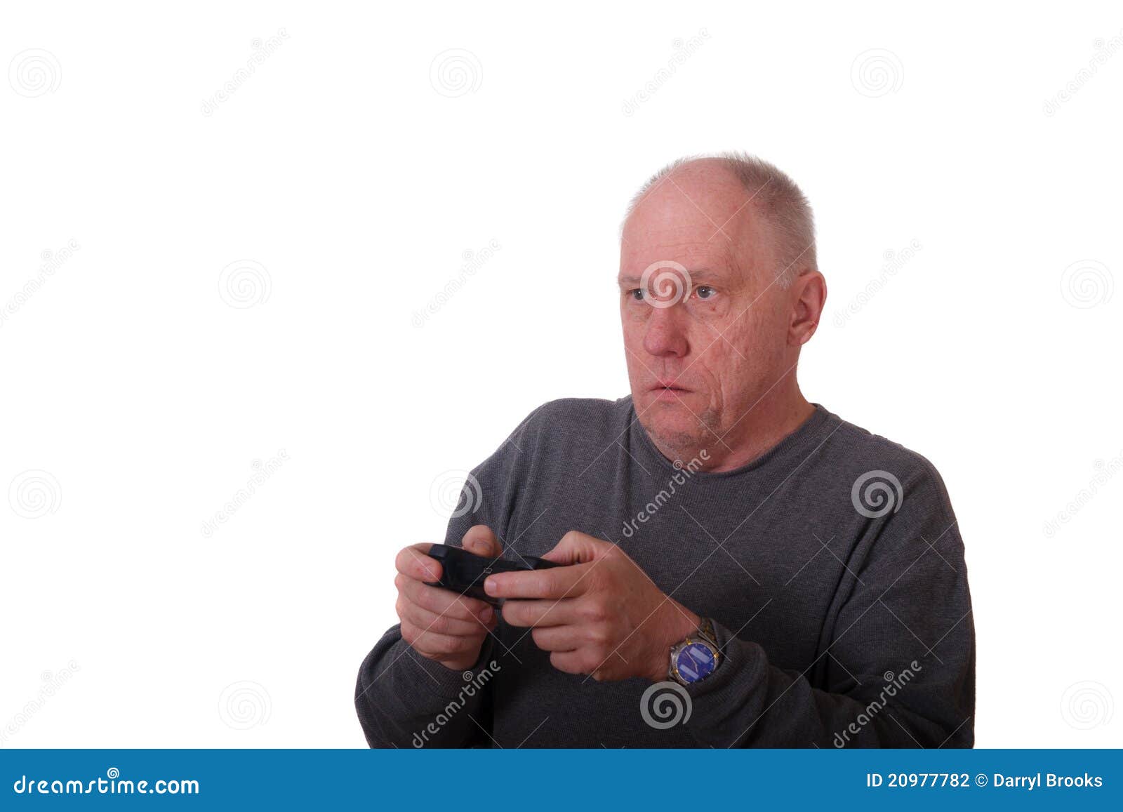 Older Bald Man in Gray Shirt Playing Video Game Stock Photo - Image of ...