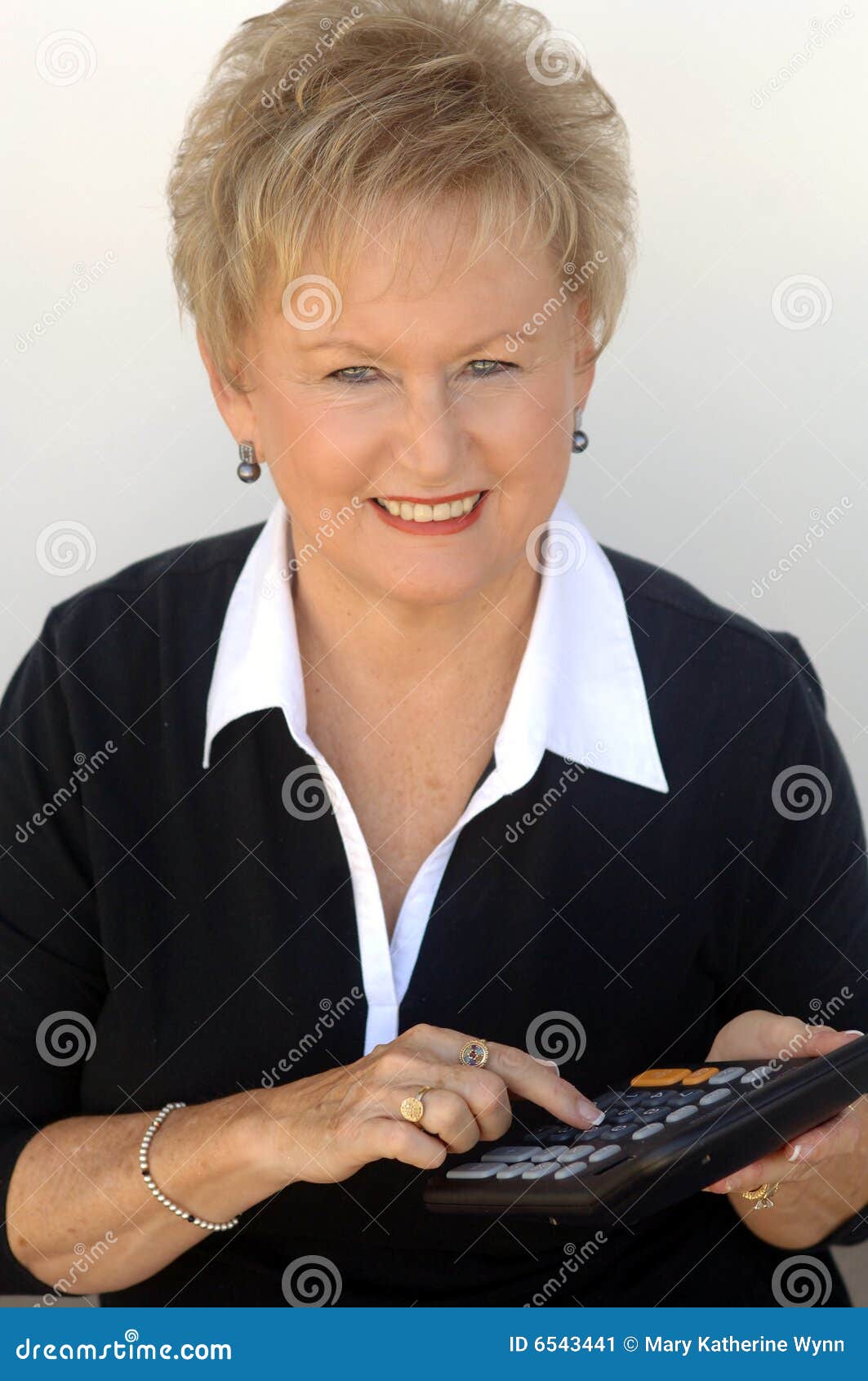 Older Business Woman with Calculator Stock Image - Image of fashionable ...