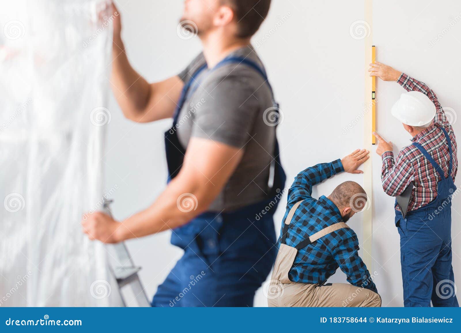 Contractors at work stock photo. Image of overalls, protective - 183758644