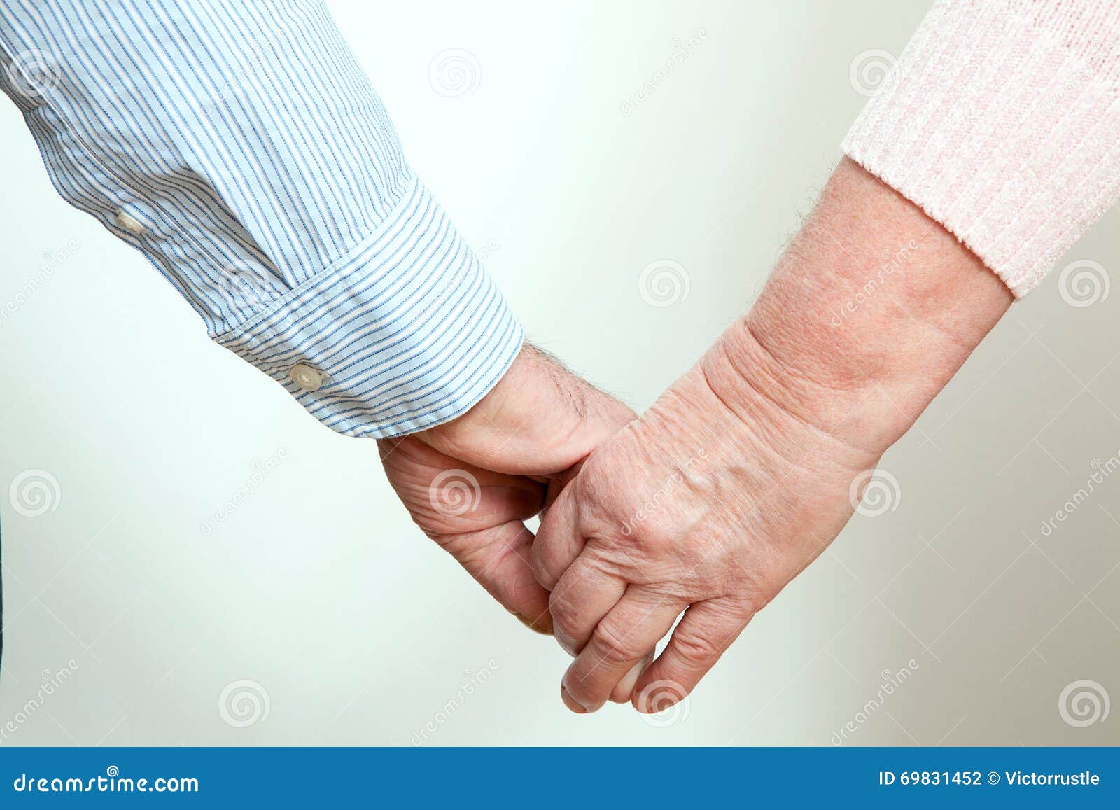 Older Couple Holding Hands on White Background Stock Photo - Image of ...