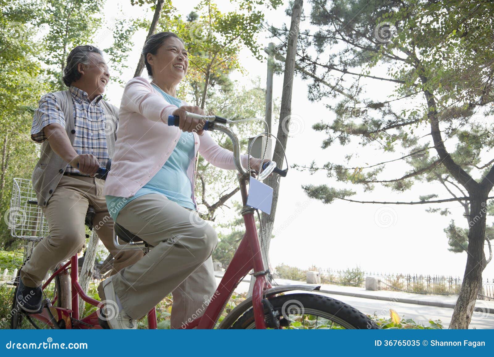 Older Couple Riding Tandem Bicycle, Beijing Stock Image - Image of ...