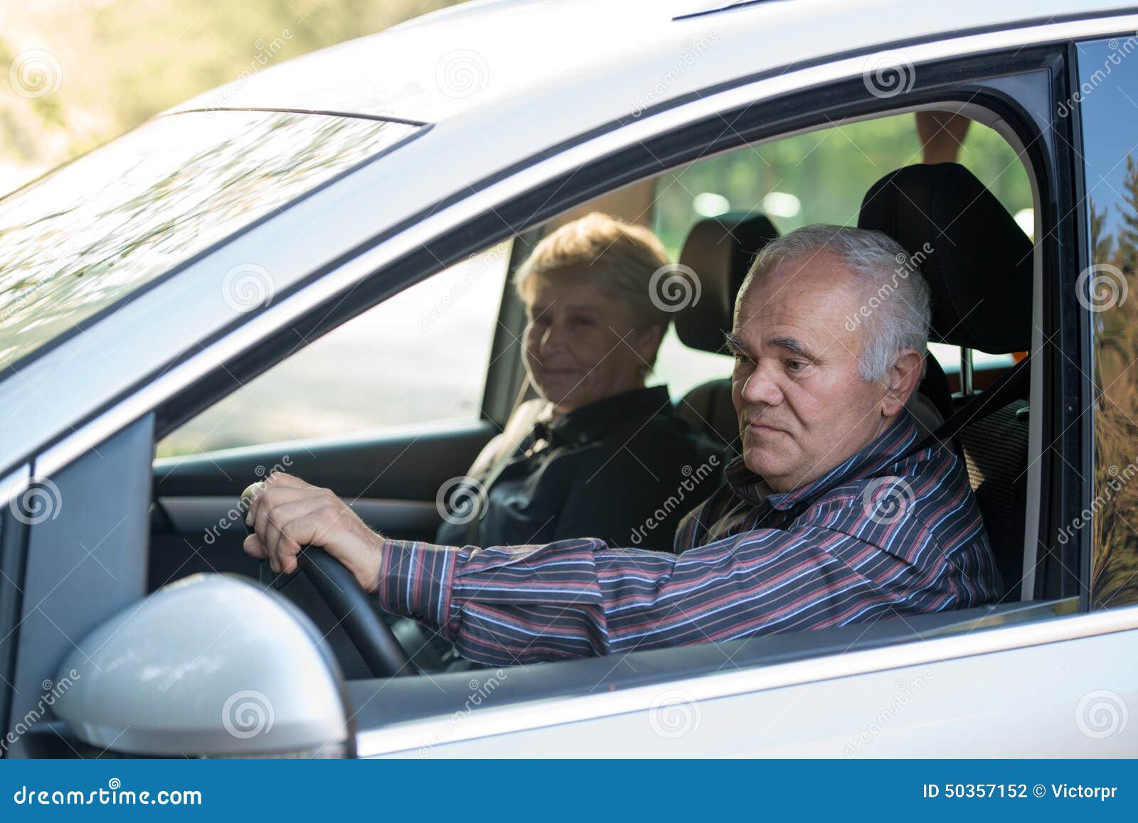 Older Driver Using Smartphone Stock Photos - Free & Royalty-Free Stock ...
