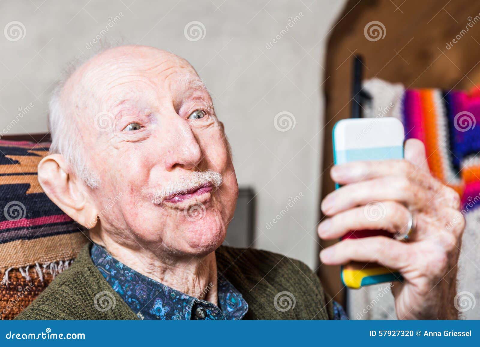 Older Gentleman with Smartphone Stock Photo - Image of seated, grin ...